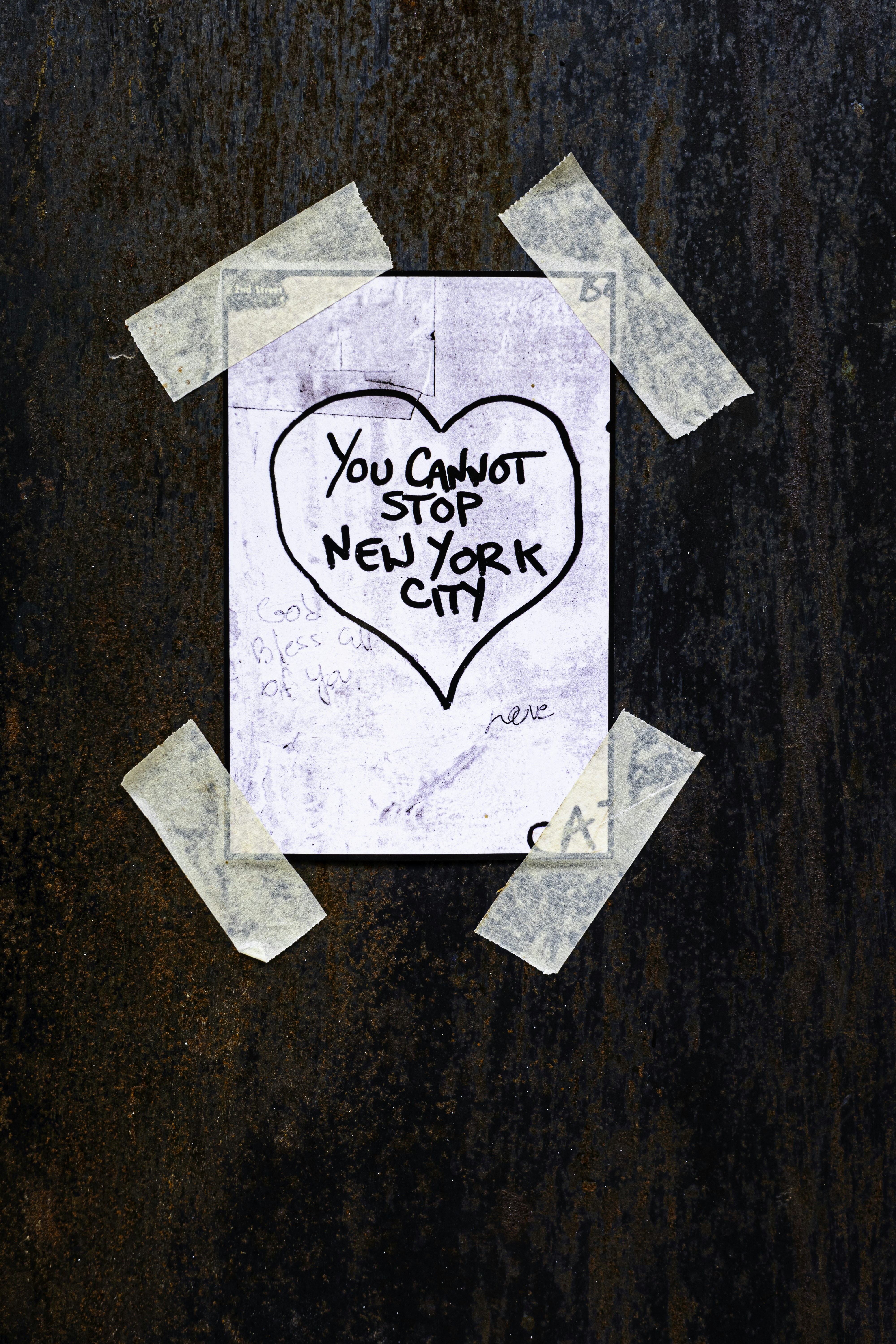 Heart on Rust: A taped note of NYC longing on a weathered surface