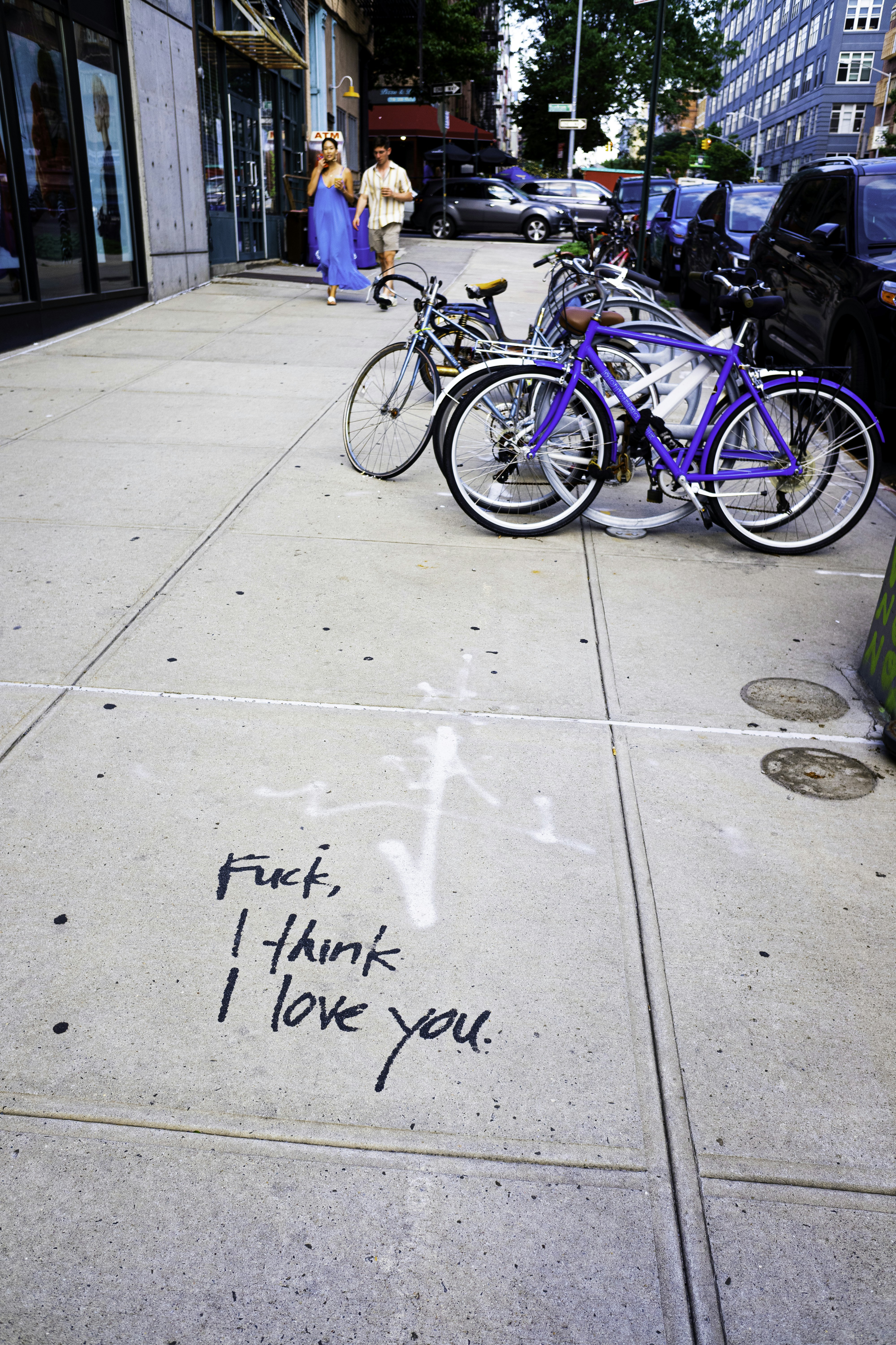 Bikes in the Shade: A City Sidewalk Confronts a Message