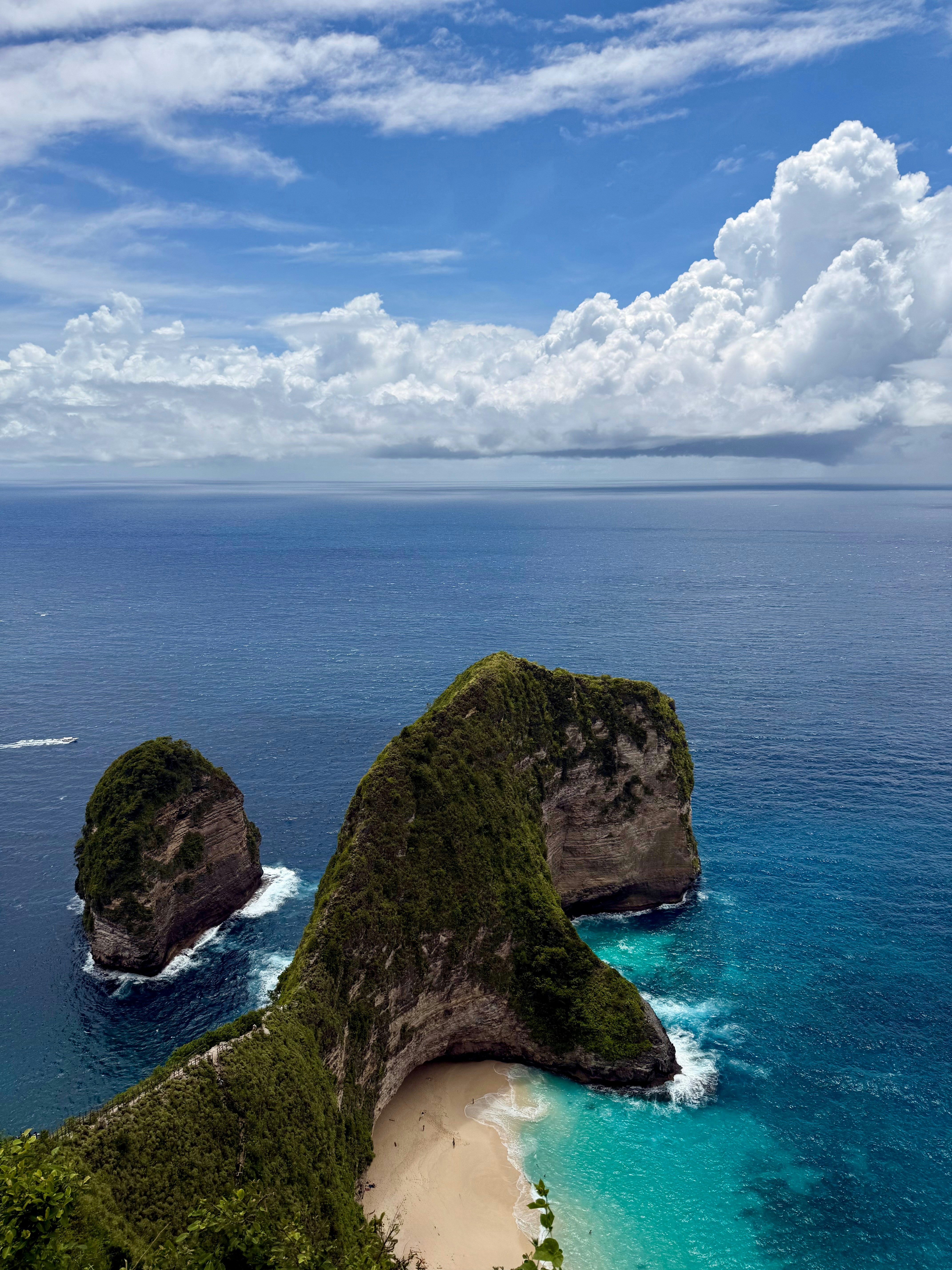 Emerald Steps: Aerial View of Sea Stacks Fringing a Hidden Beach