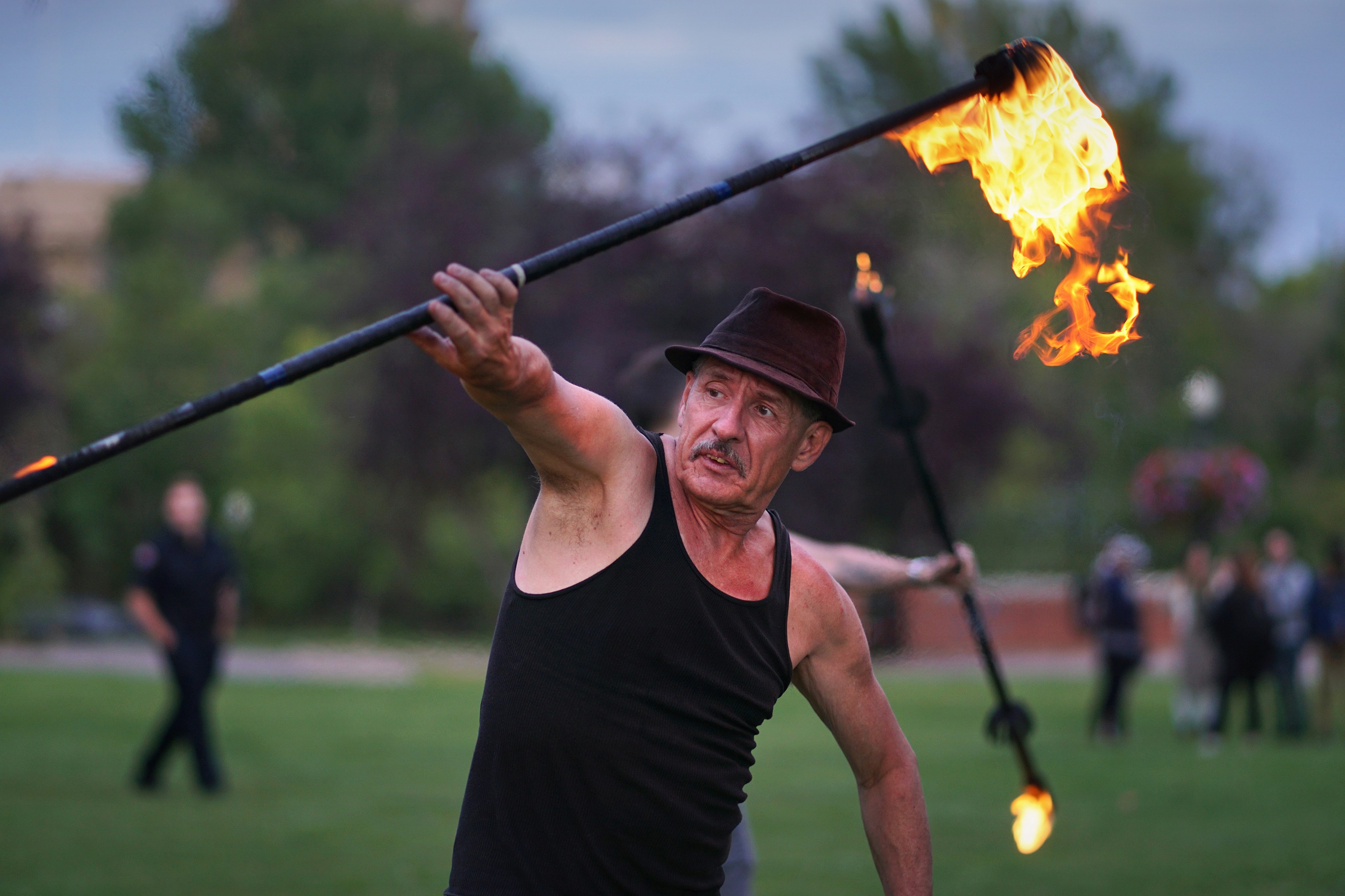 Fiery Juggle: A Street Performer Turns Flame into Focus