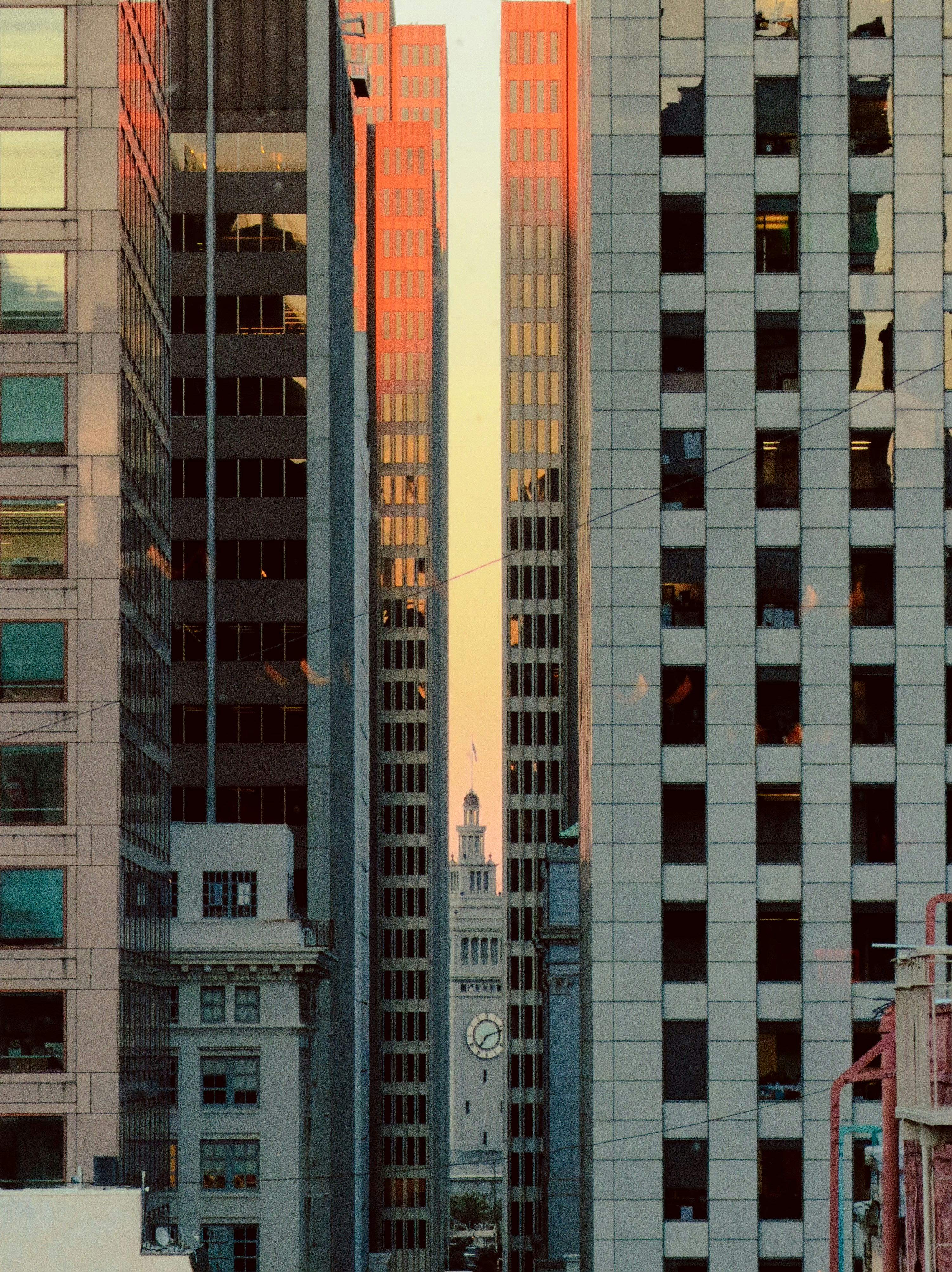 Glimmer Between Skyscrapers: A Narrow Vantage Point to the City Clock