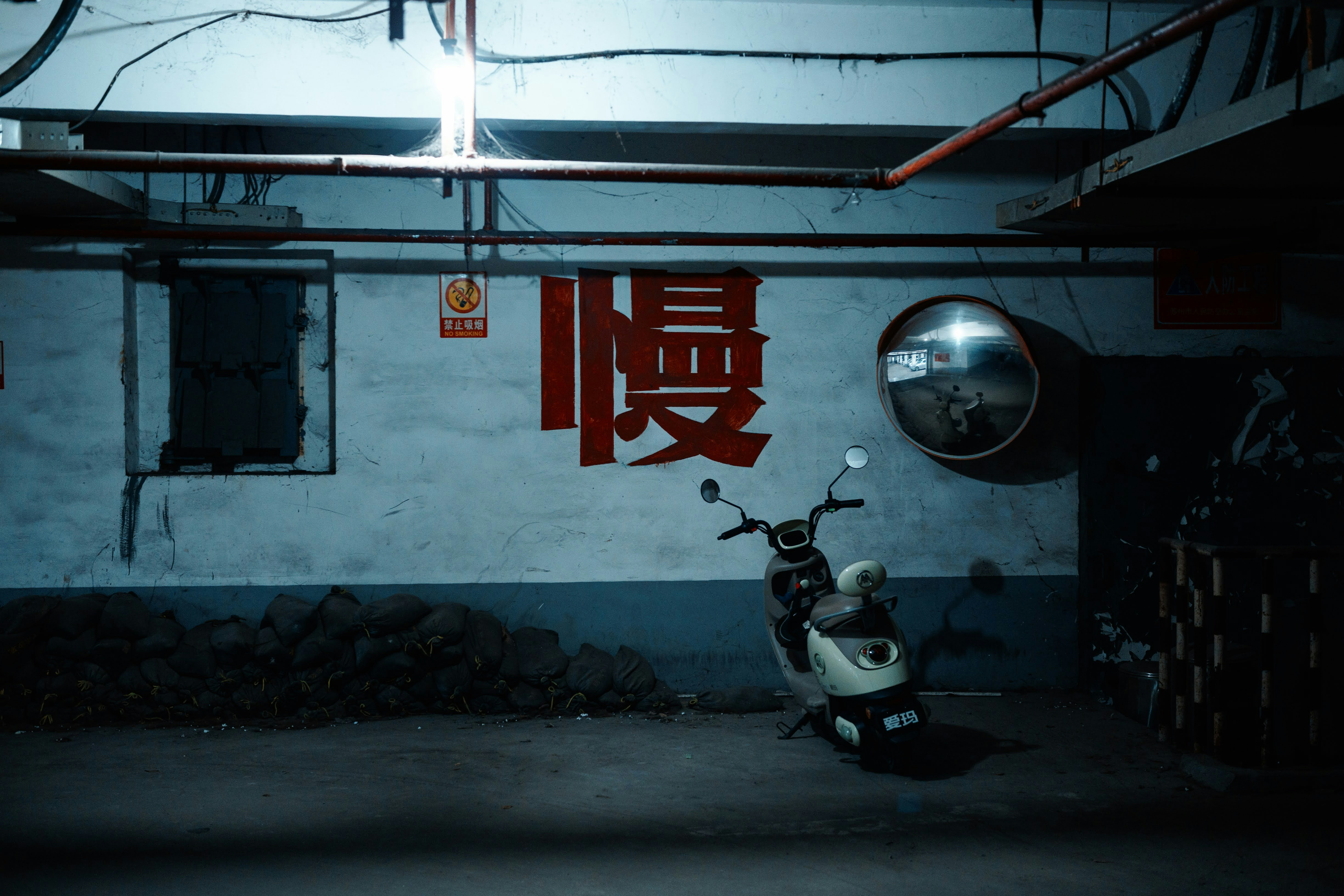Low-lit Alley Portrait: Scooter Under Neon Blue Flux