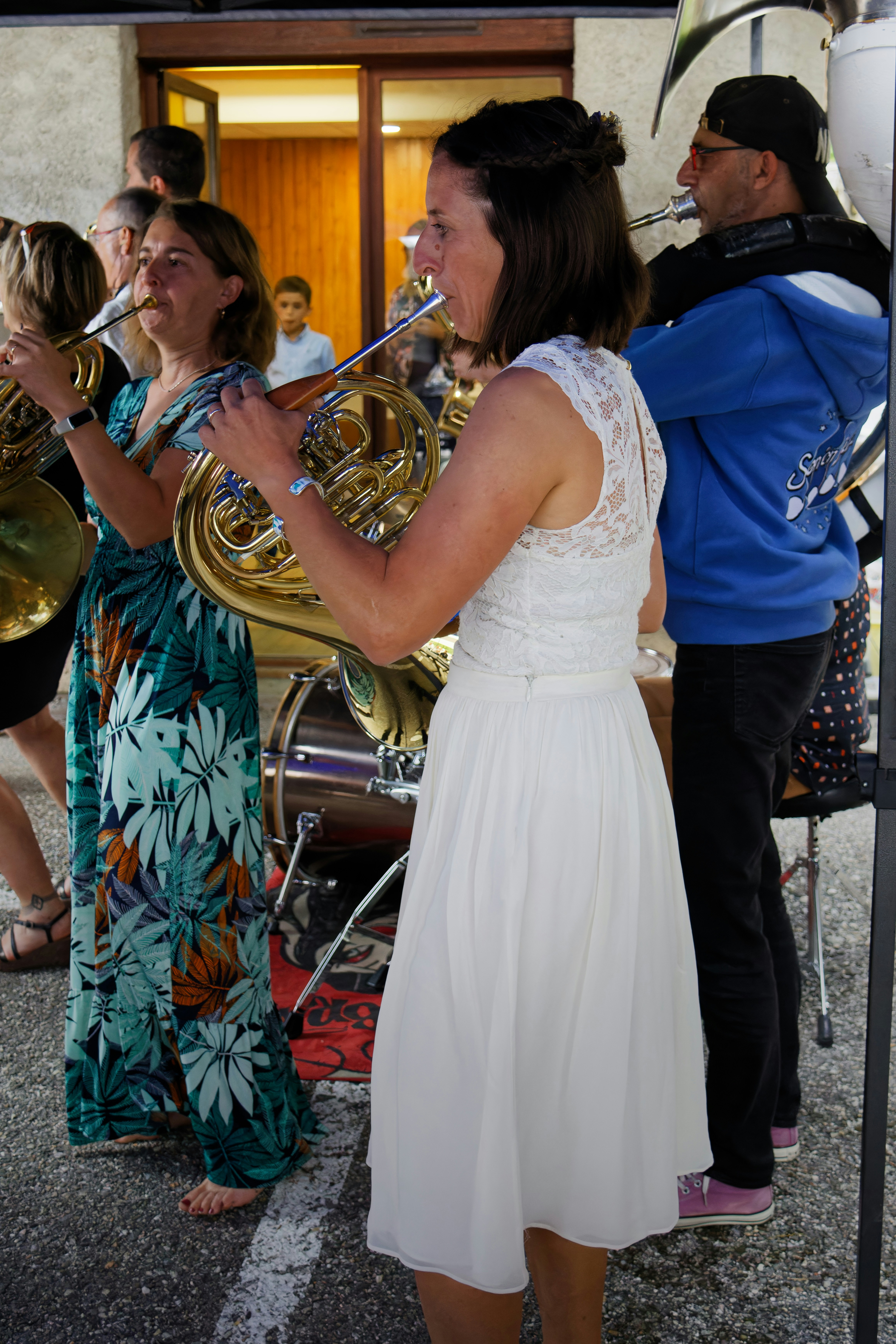Brass Quartet in Focus: a Bridal Verse Under a Street-side Spotlight
