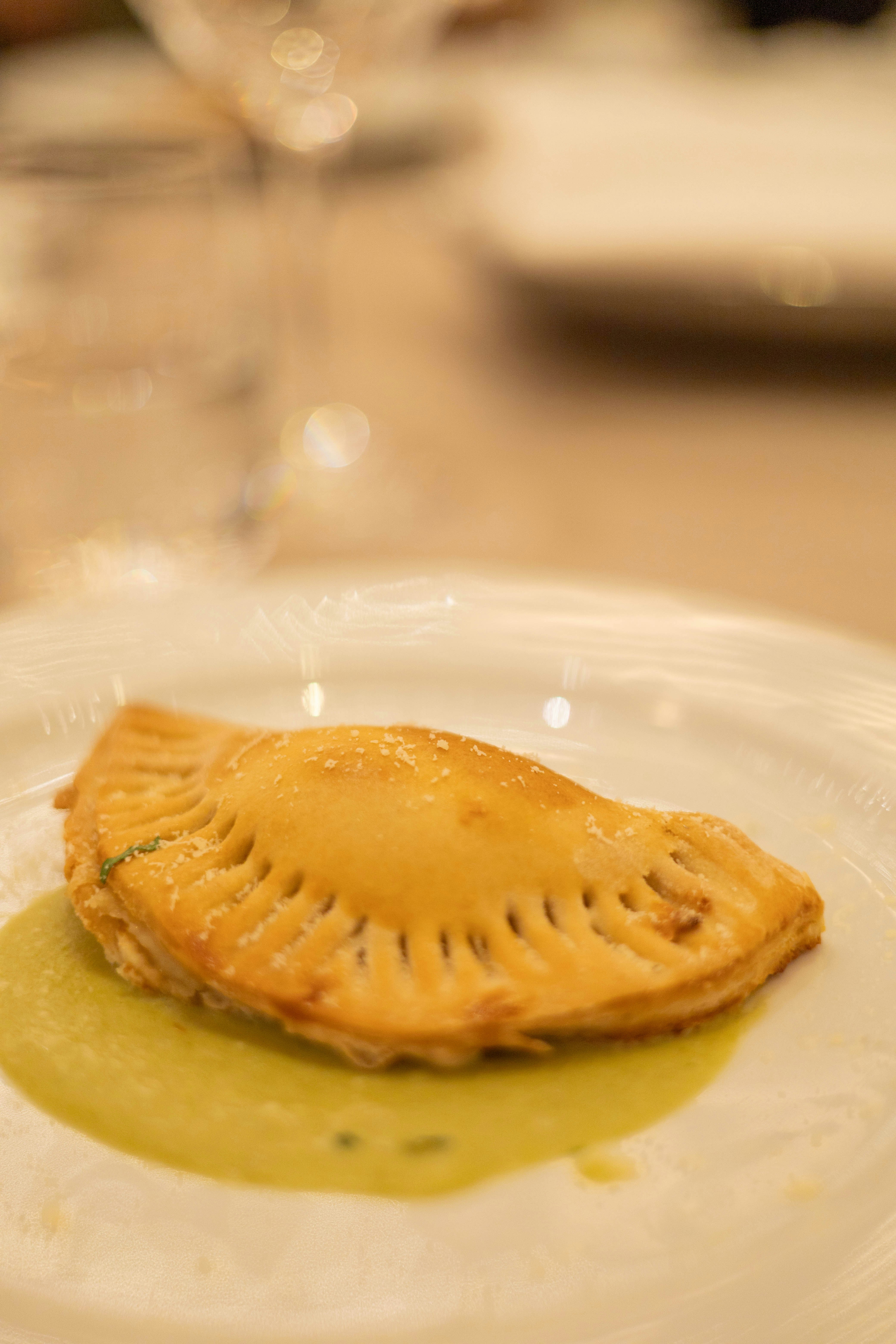 Golden Turnover on a Creamy Stage