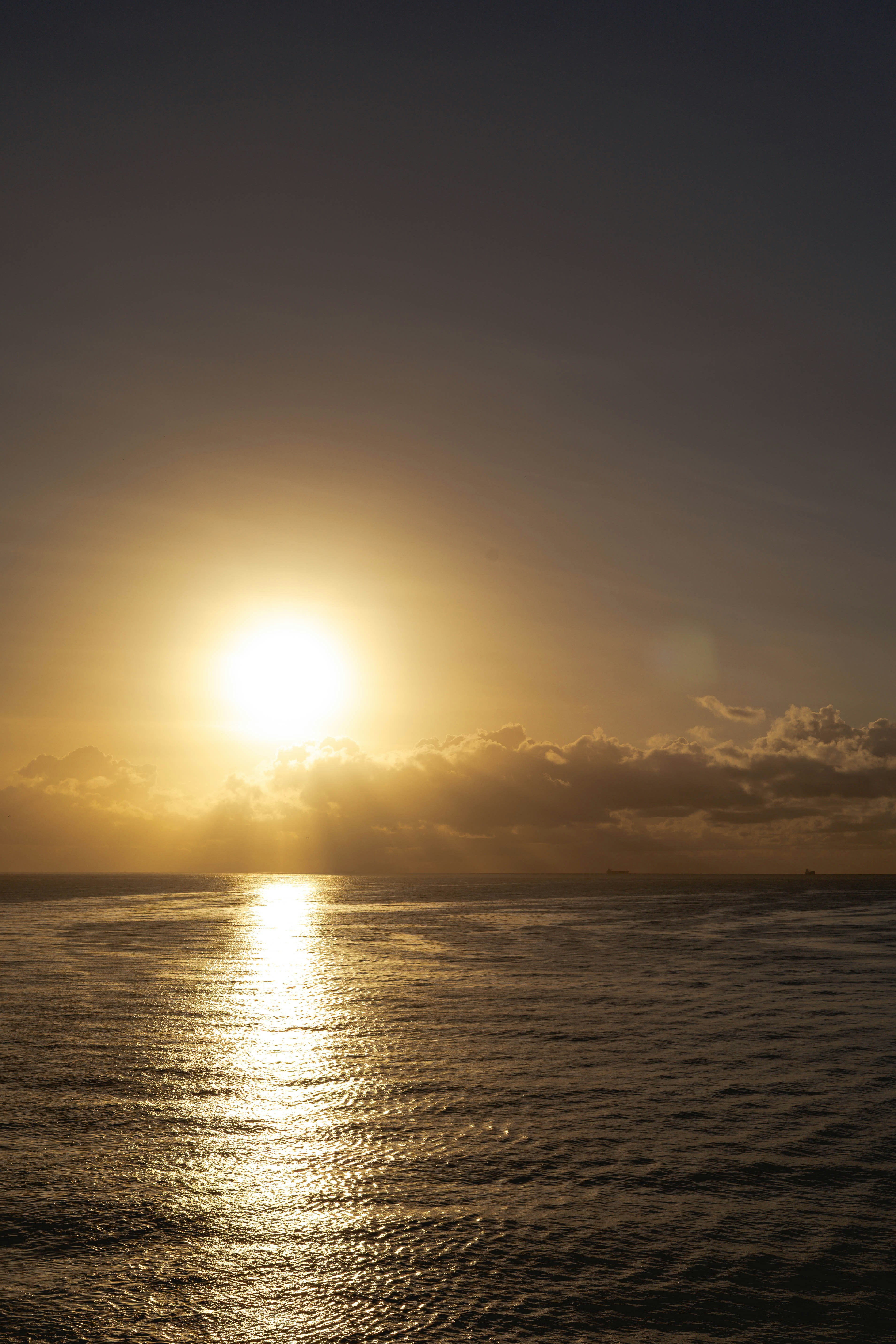 Golden Horizon: Sun, Sea, and Quiet Reflection