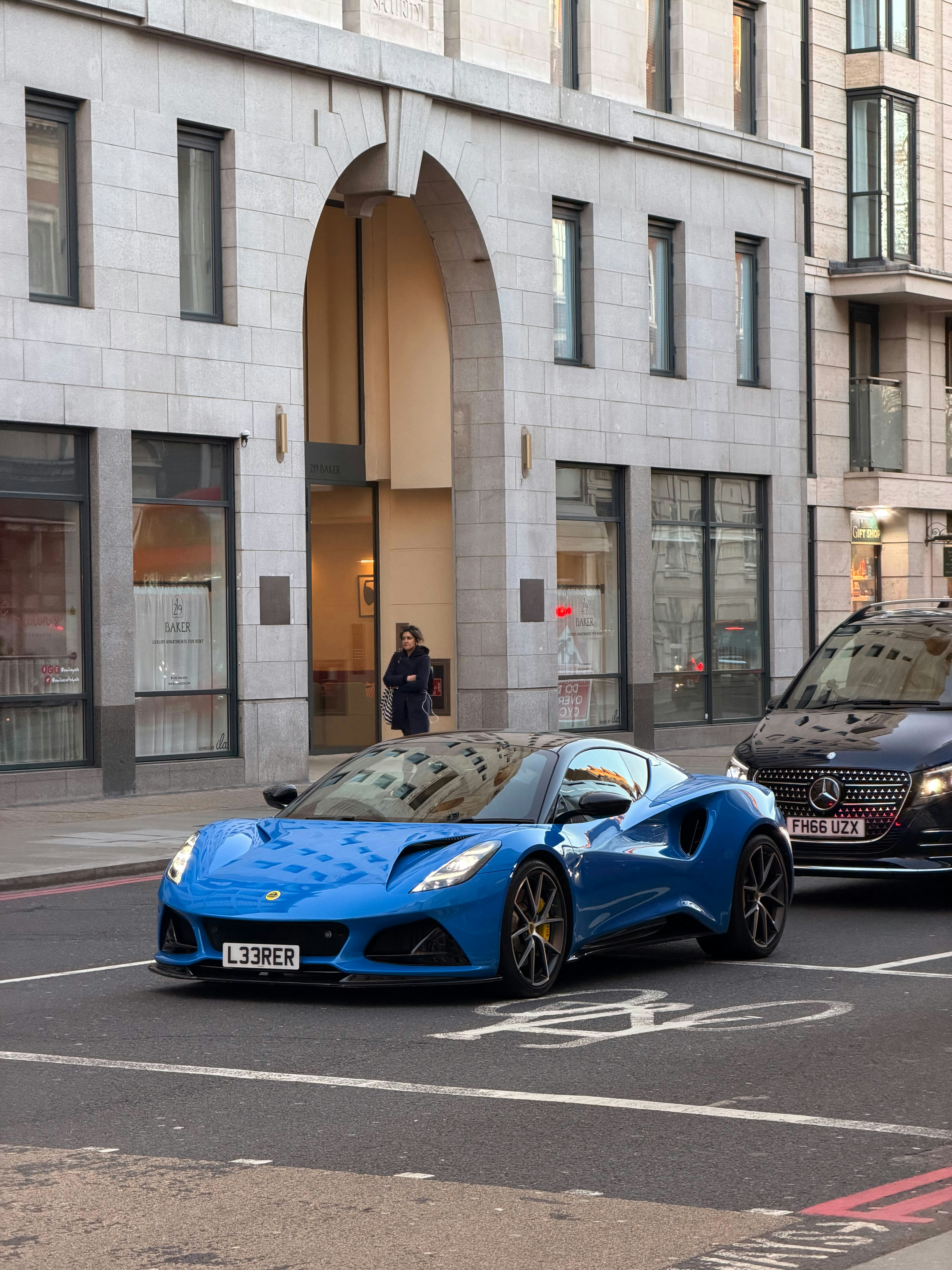 Blue Ferrari on a Quiet City Street