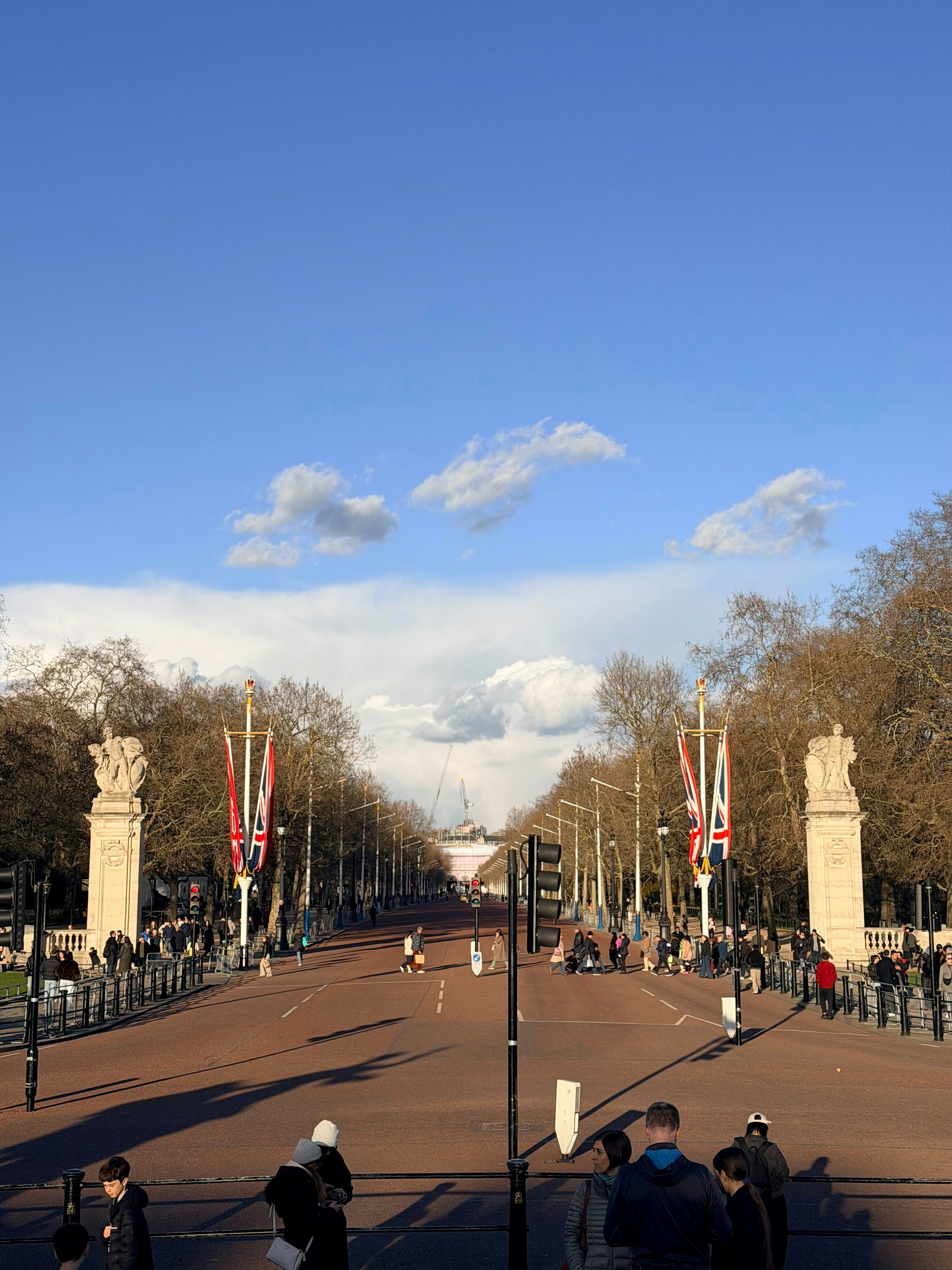 Approach to the Great Avenue: A London-like Parade Ground Framed by Flags and Statues