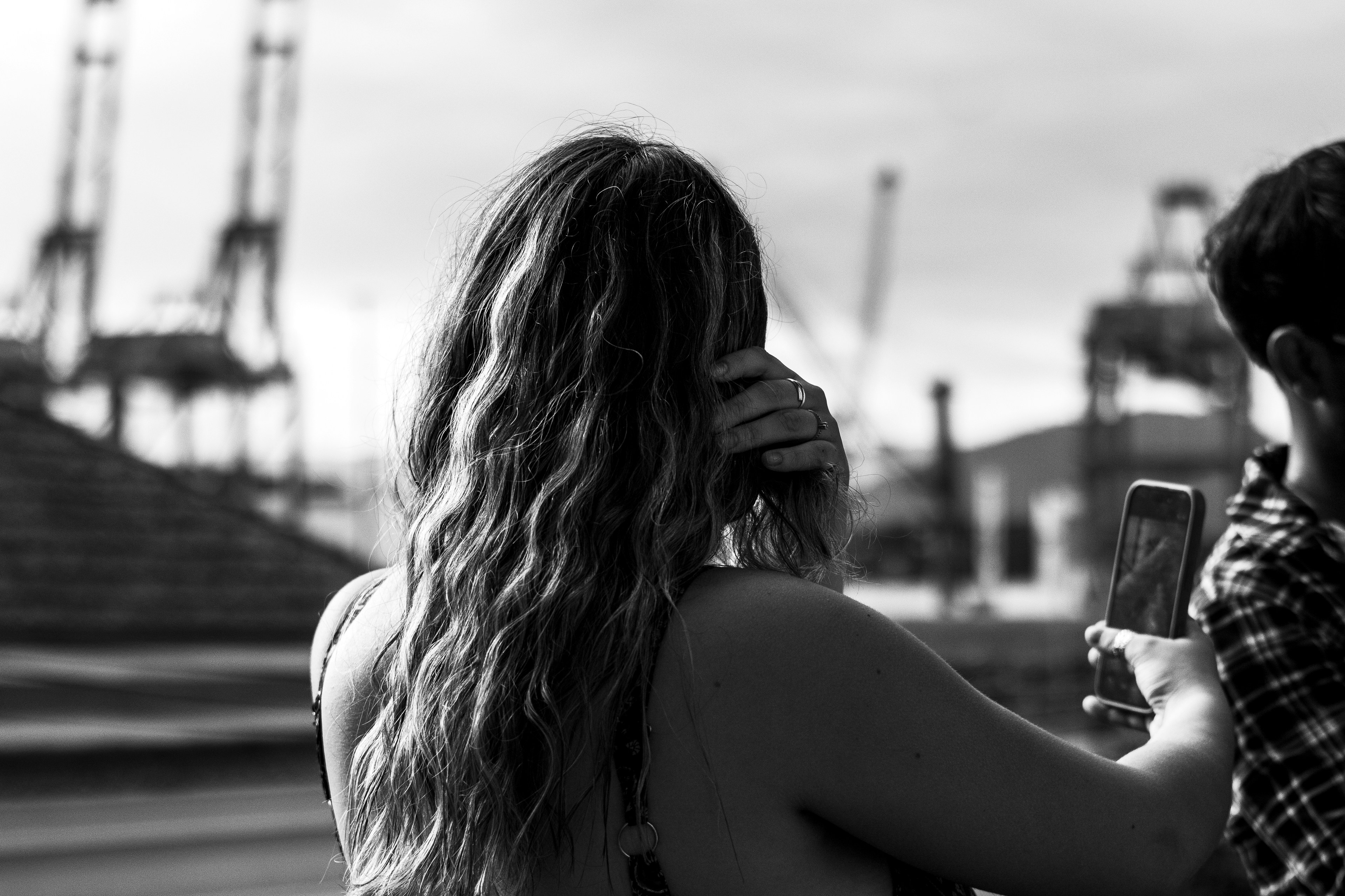 Backlit Moment: A Shared Pulse in Black and White