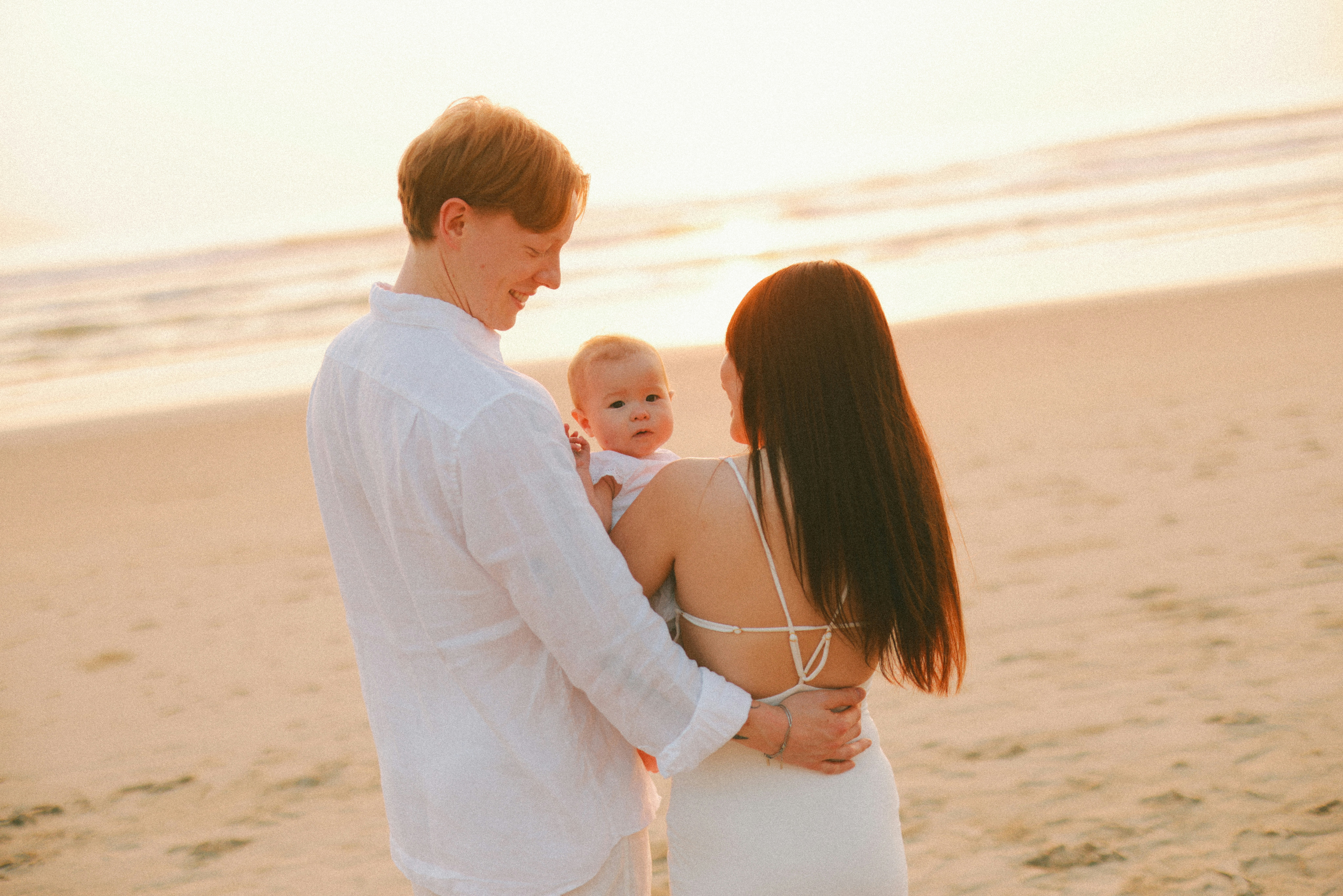 Face-to-face in the glow: a family at golden hour