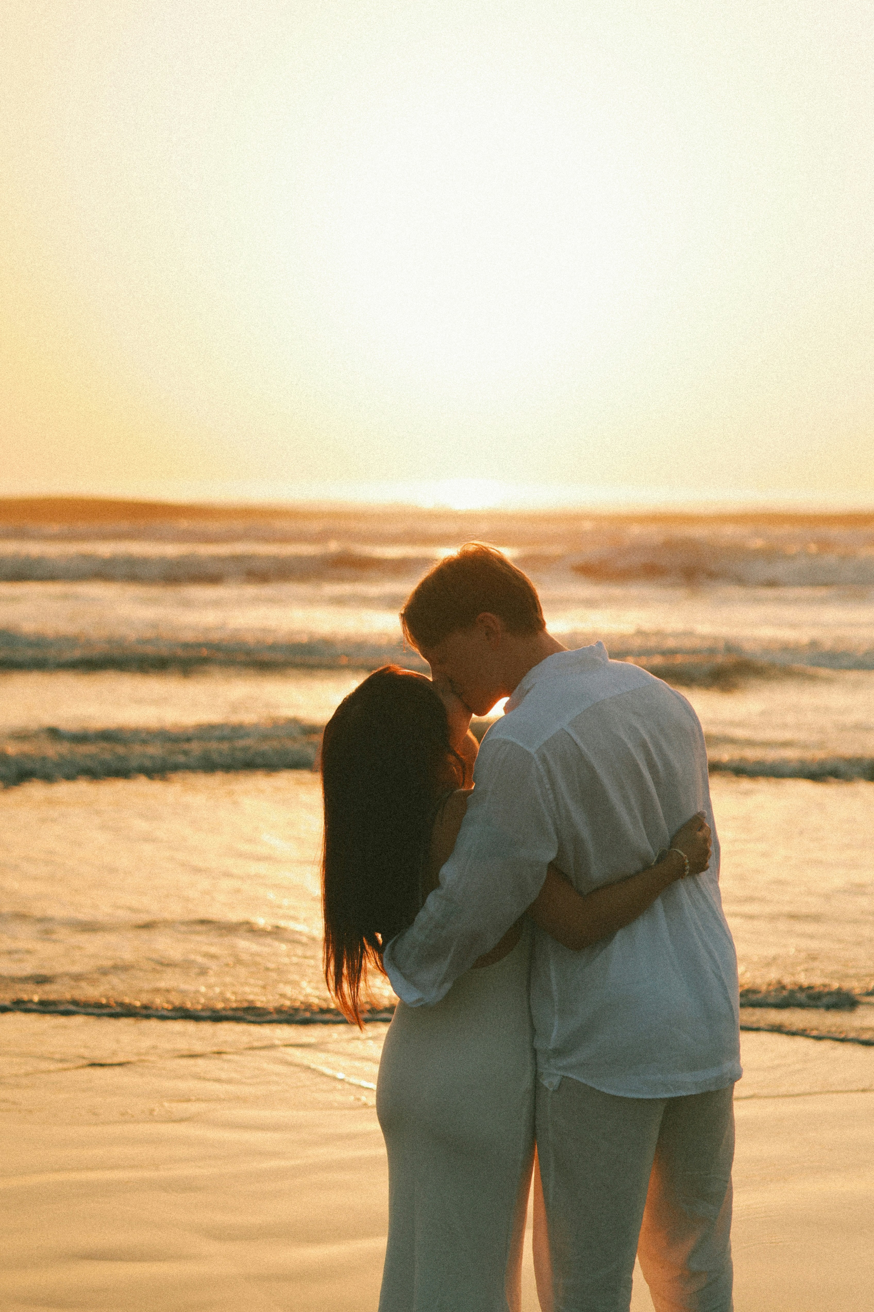 Sunset Embrace by the Tide
