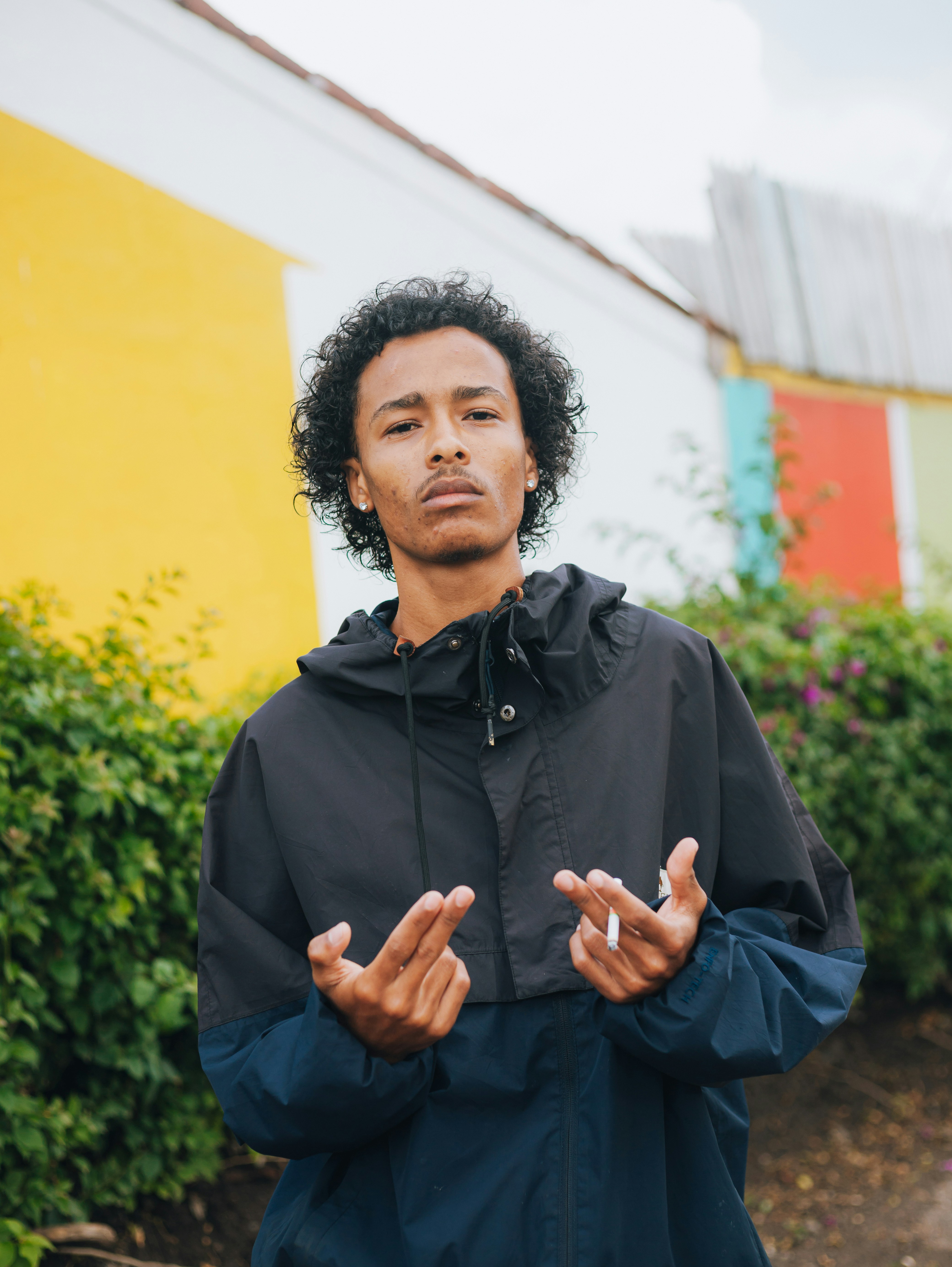 Midfield Confidence: Portrait in a Colorful Alley