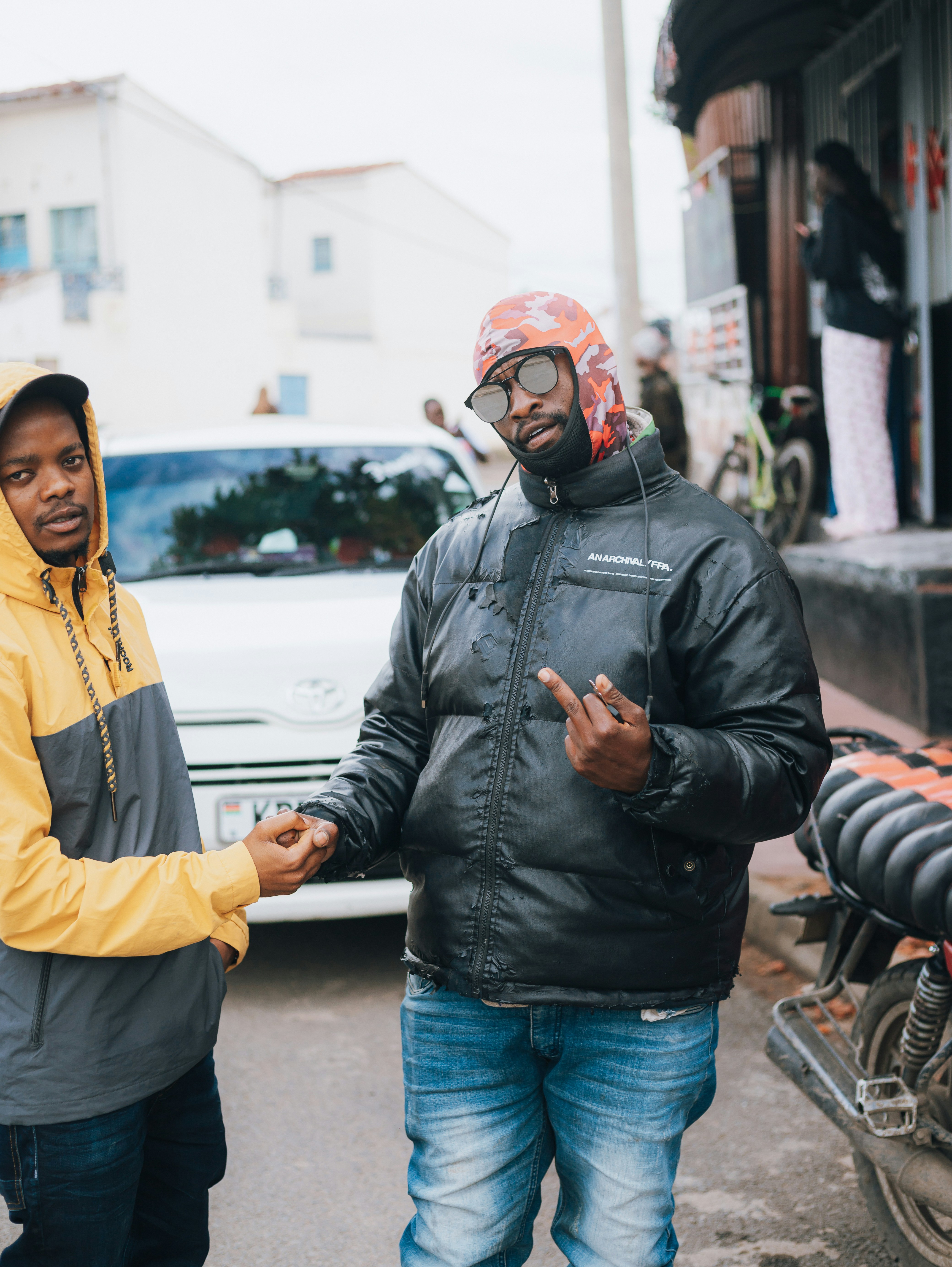Handshake in the street: a bold moment between two commuters