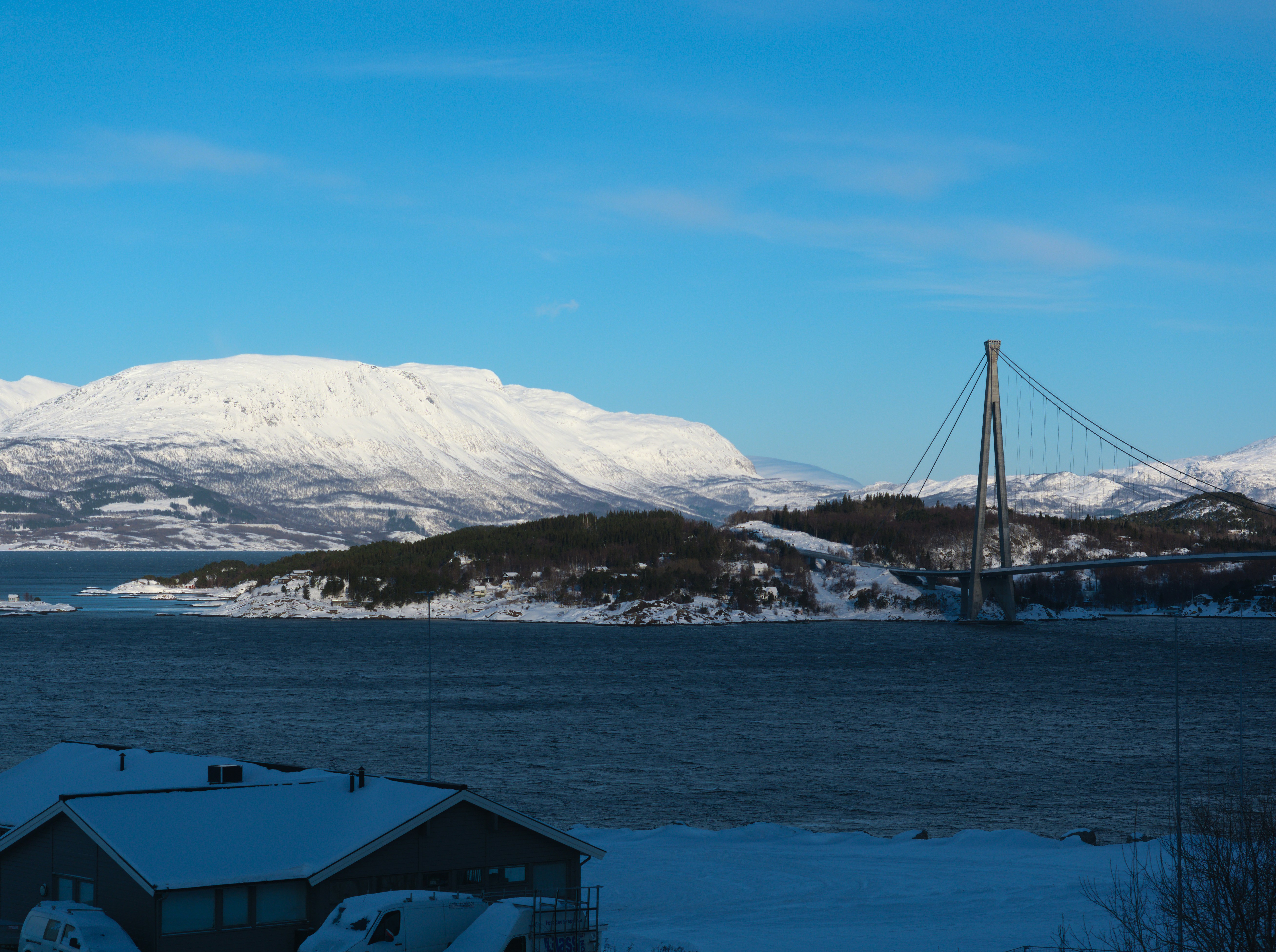 Snowbound Fjord: A Cable-Deck Crossing Over Winter Water