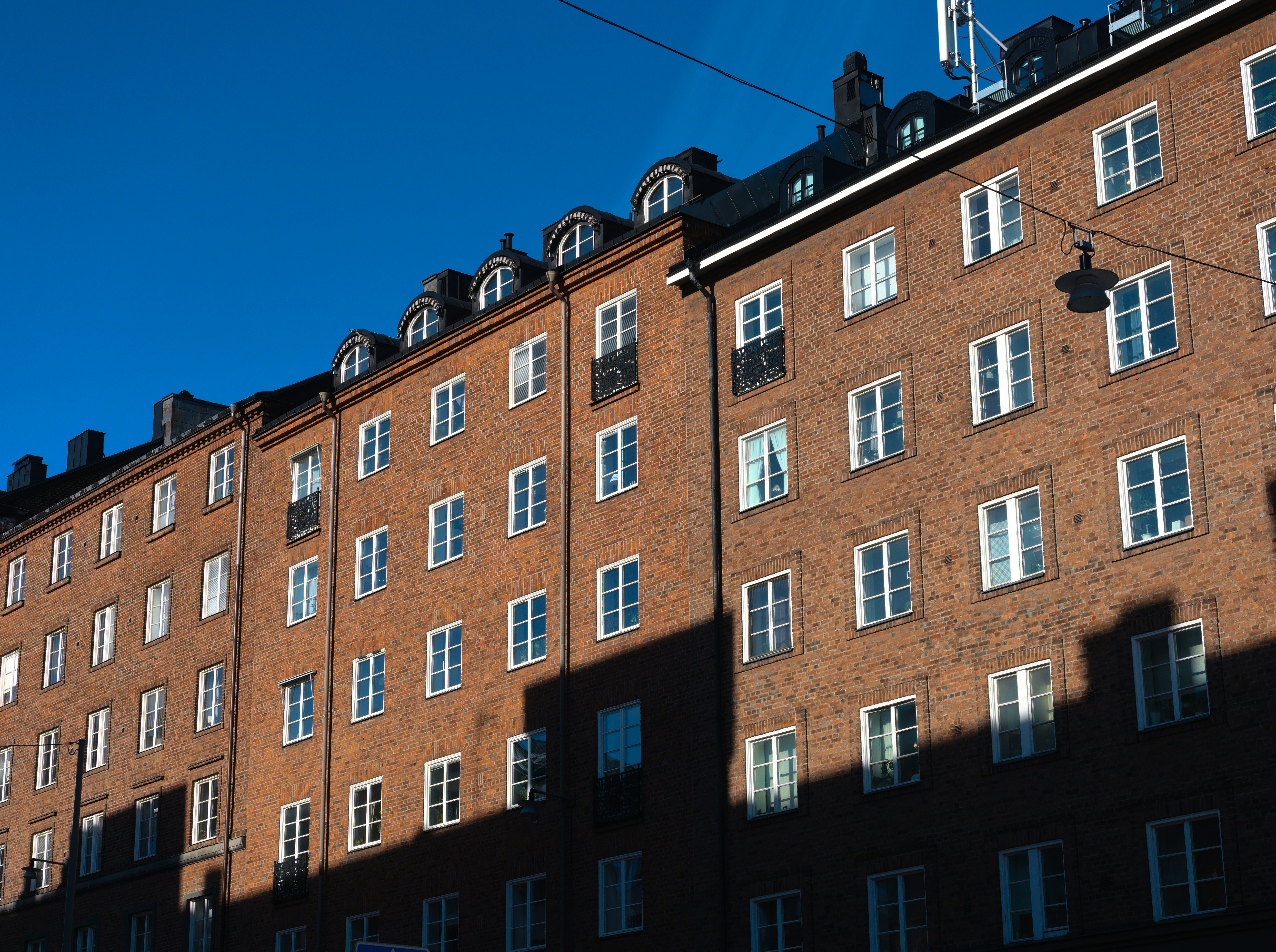 Shadowed Facade Above the Quiet Street