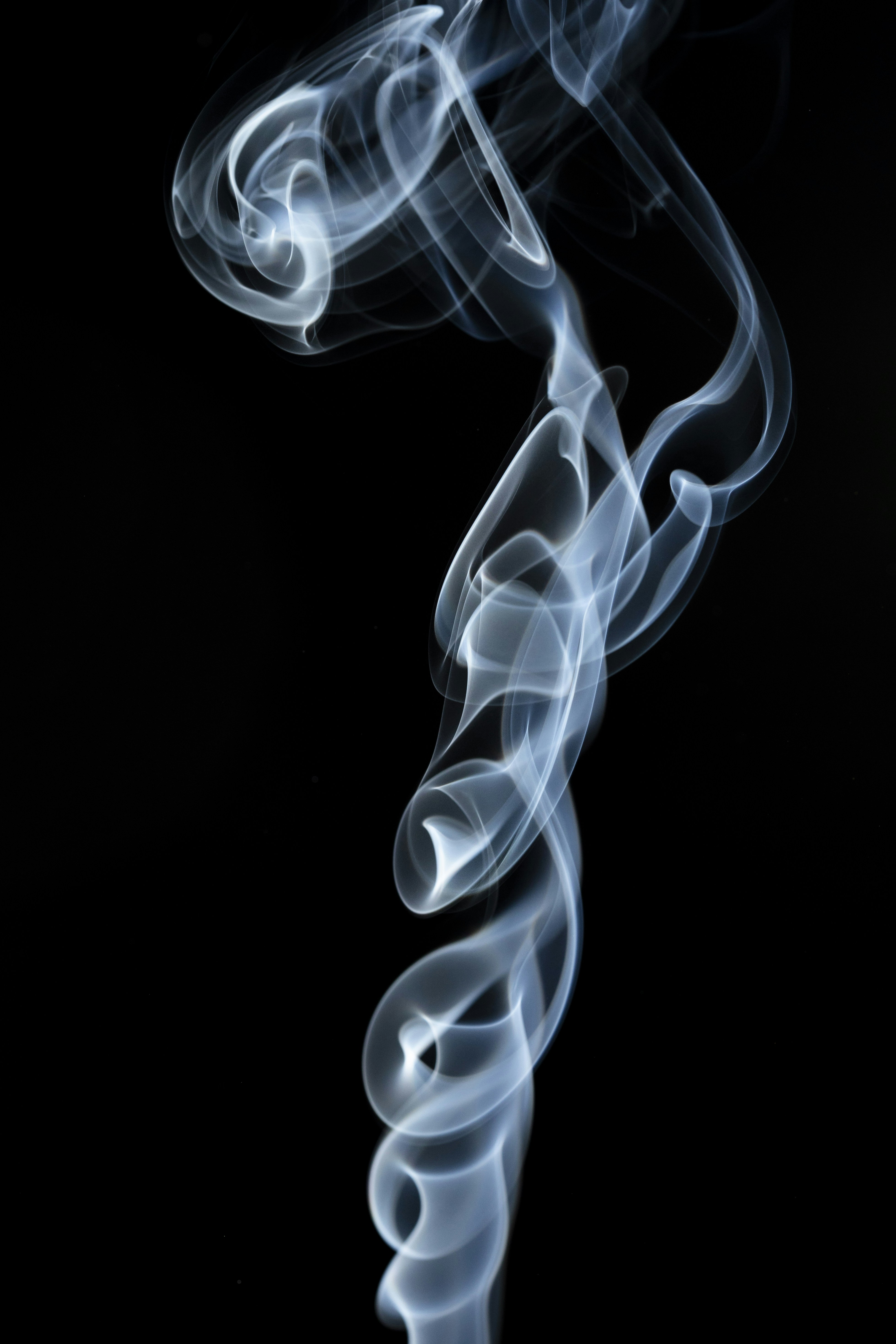 Coiled Smoke: a Needle of Light in Midnight Velvet