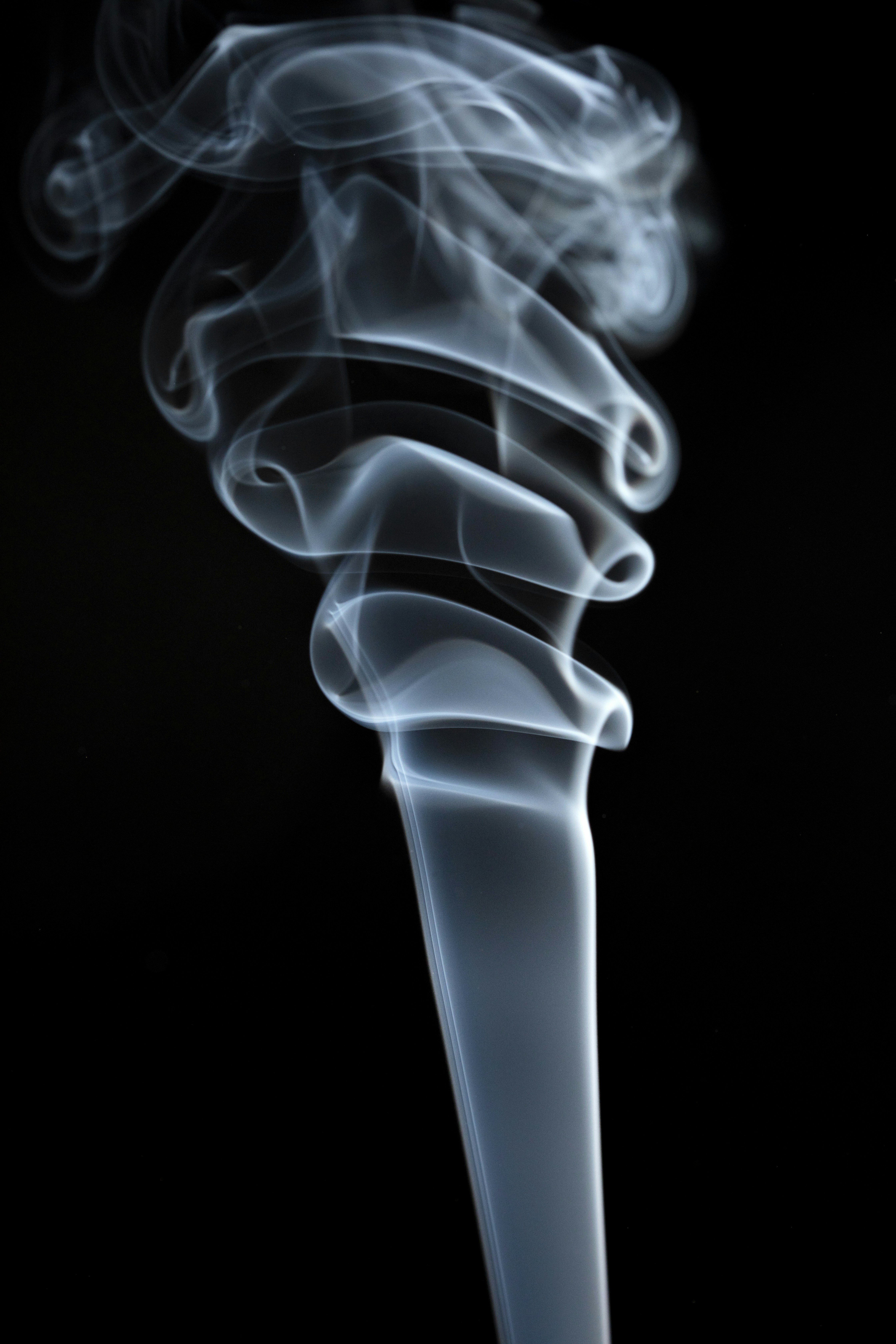 Silken Spiral: Echos of Smoke Rising from a Black Void