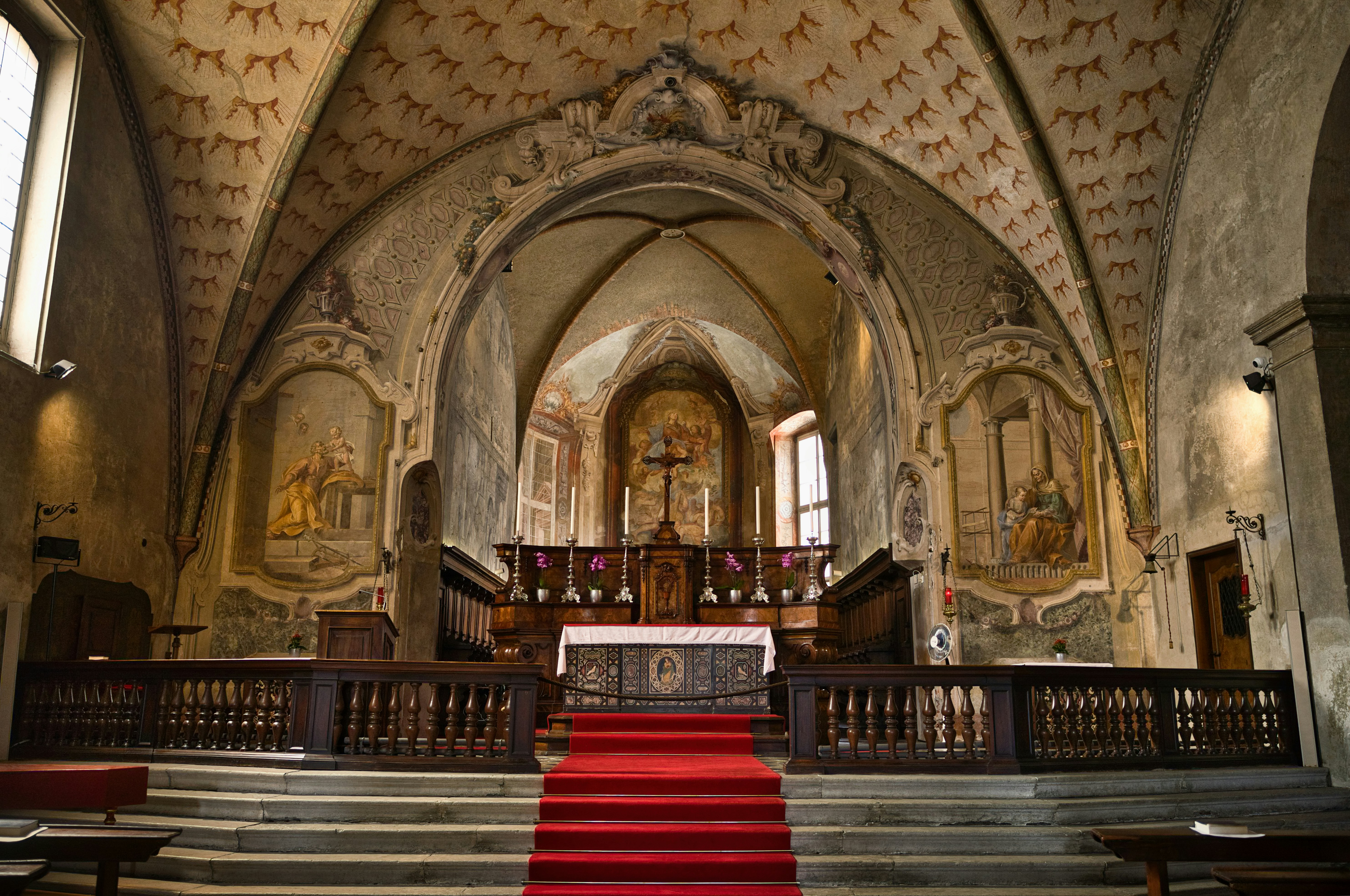 Red Carpeted Ascend: The Altar Corridor of a Historic Chapel