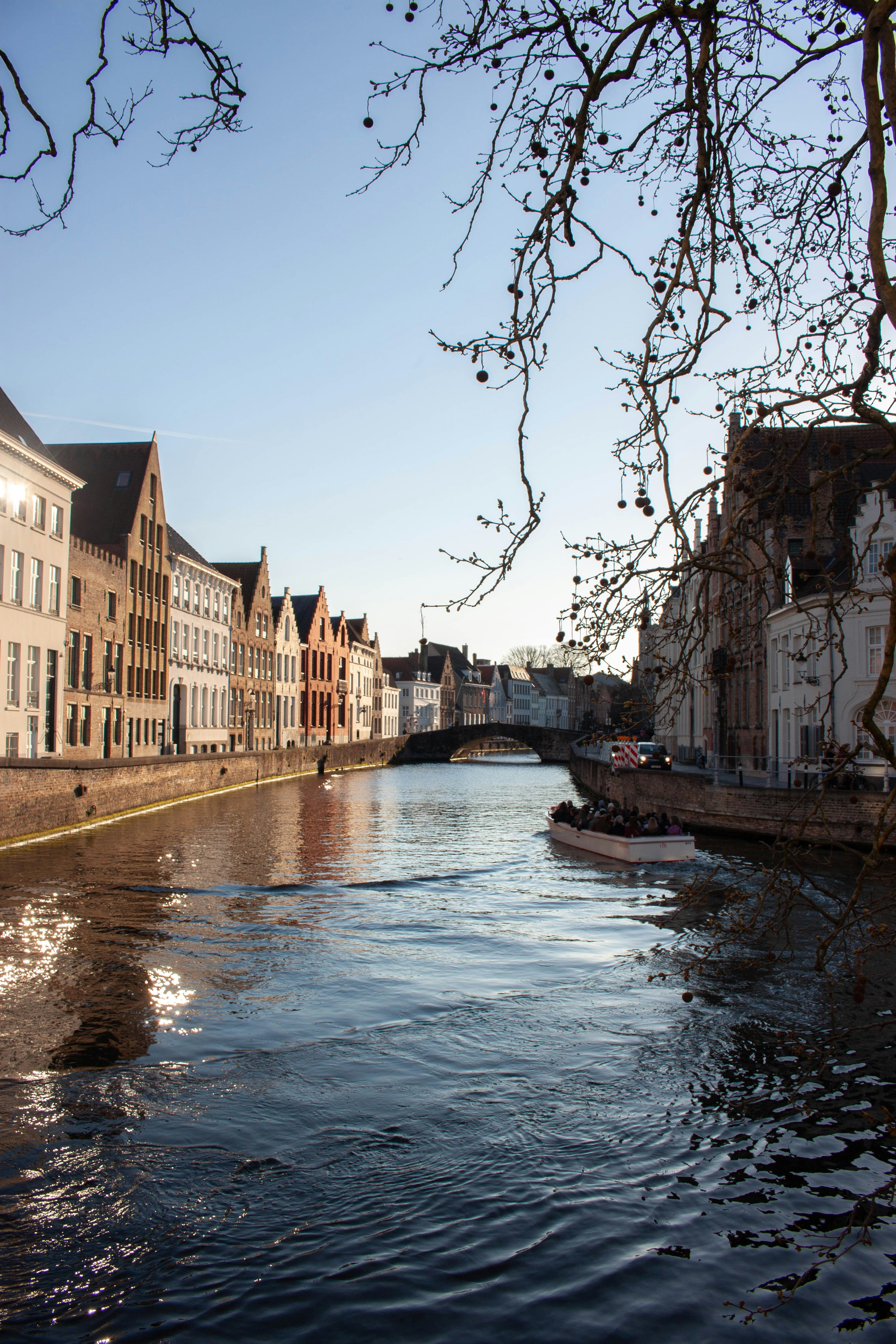 Sunlit Channel Overlook: A Quiet Belgian-Style Riverside