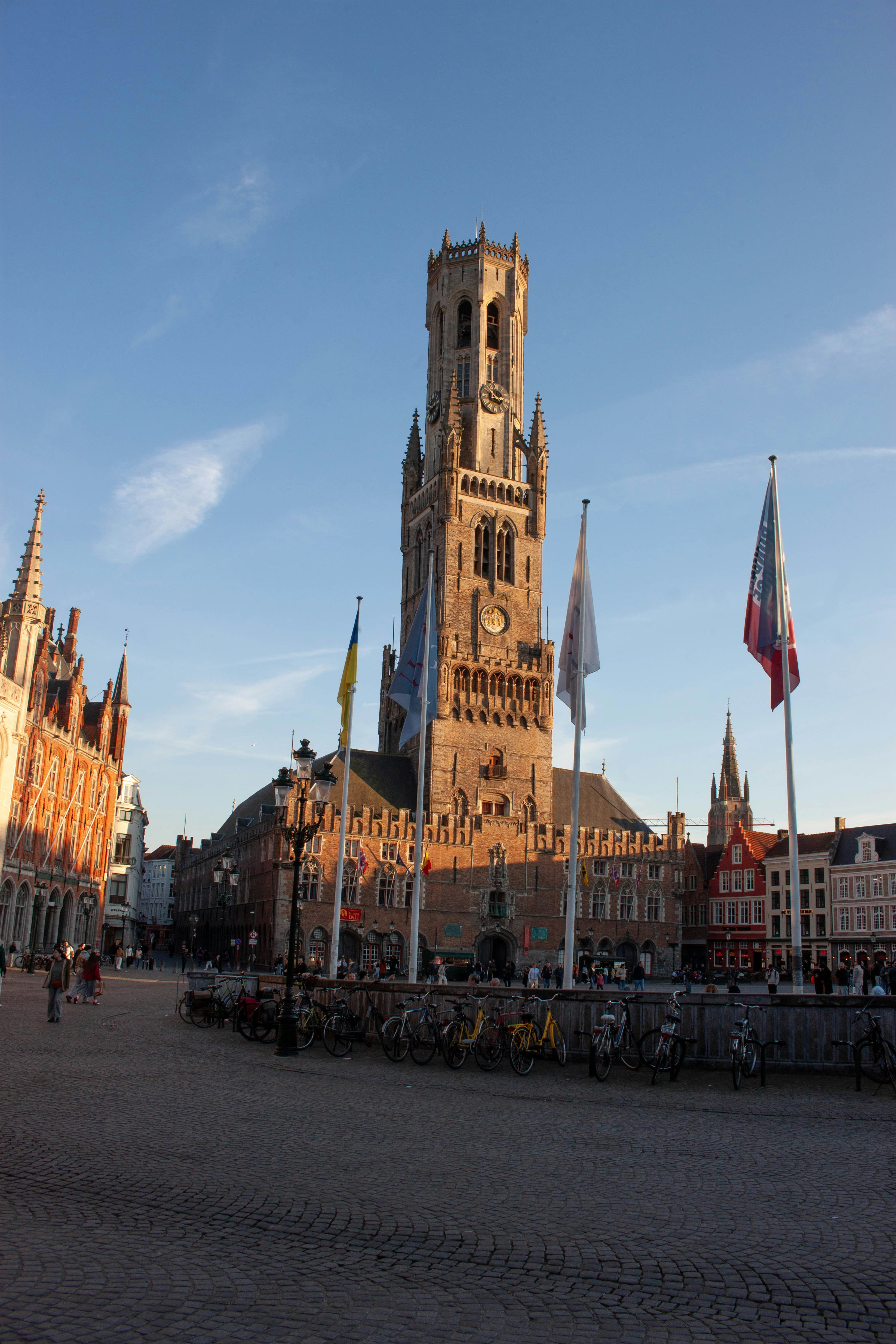 Towering Belfry over a Sunlit City Square