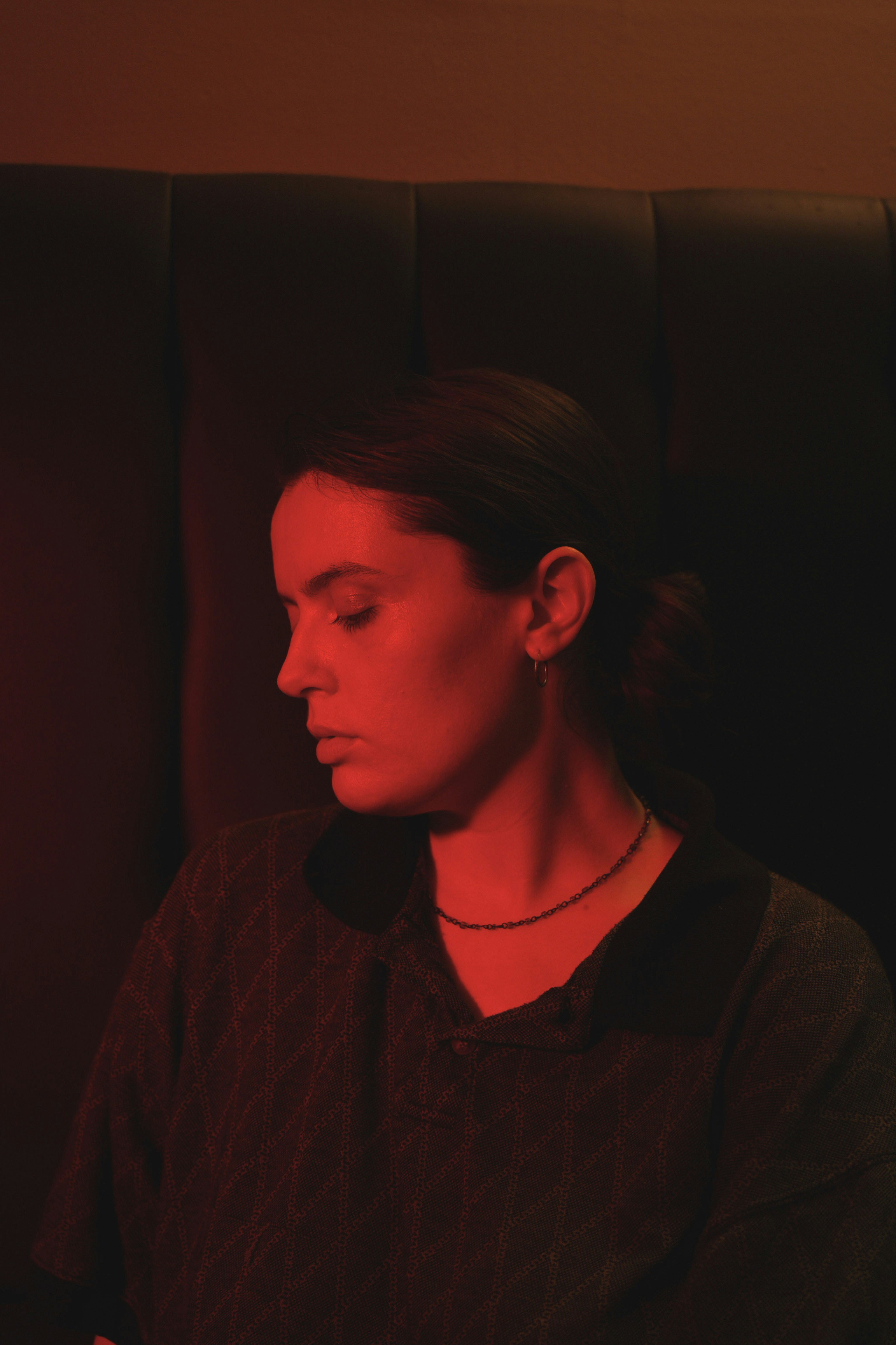 Red Hour: Quiet Portrait in Neon Lean