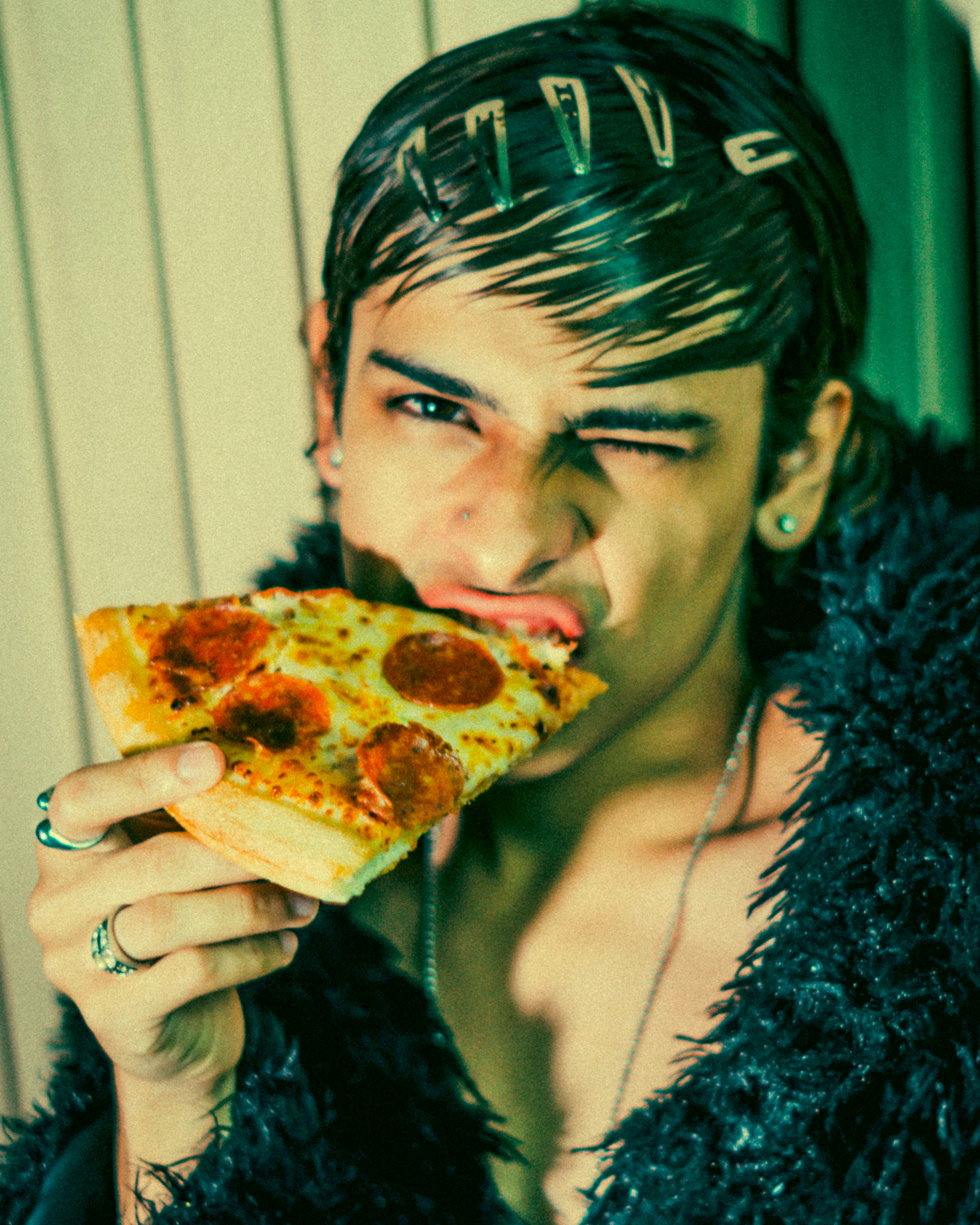 Slice of Attitude: Pizza Close-Up with a Sharp Wink