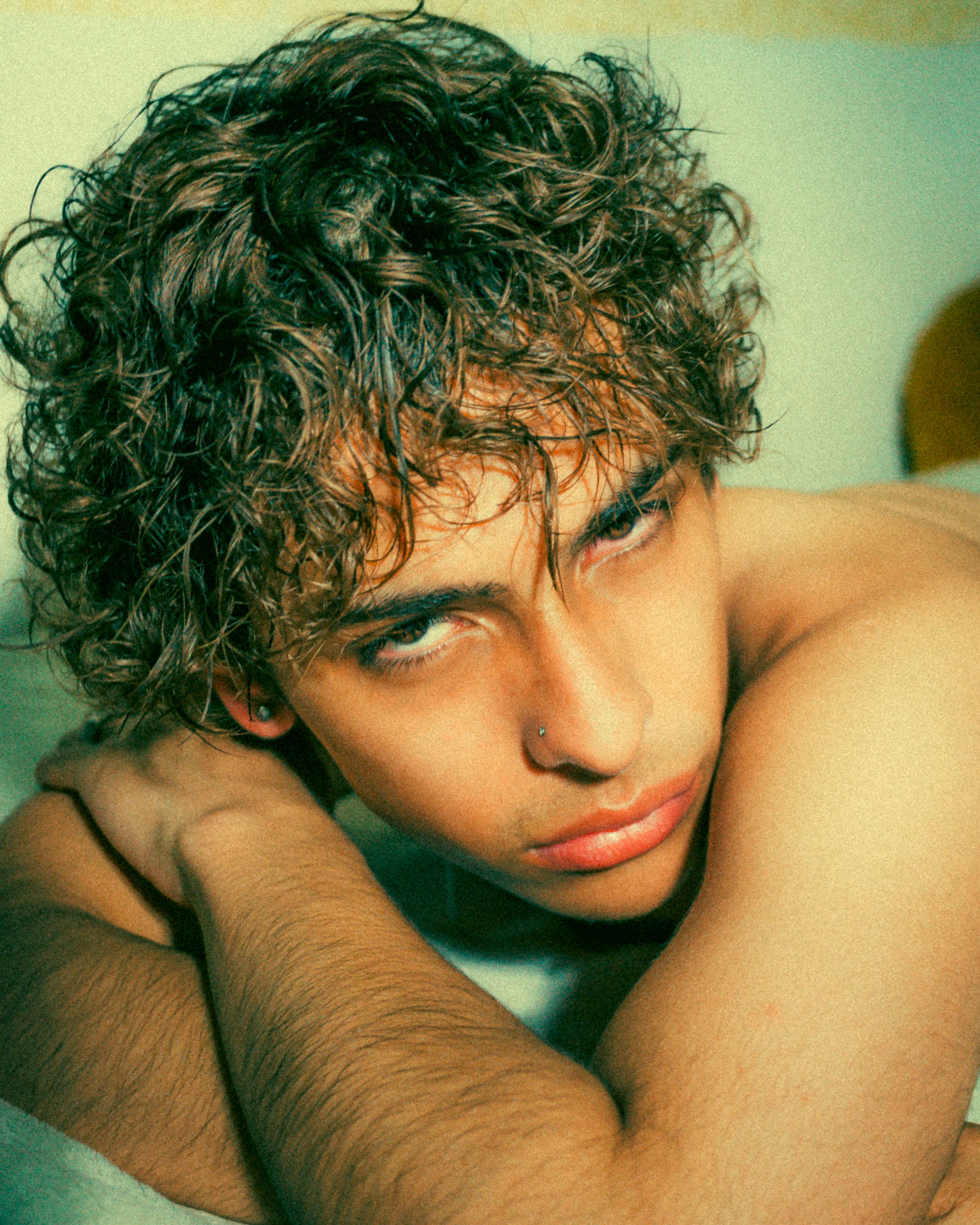 Electric gaze: tousled hair and piercing eyes