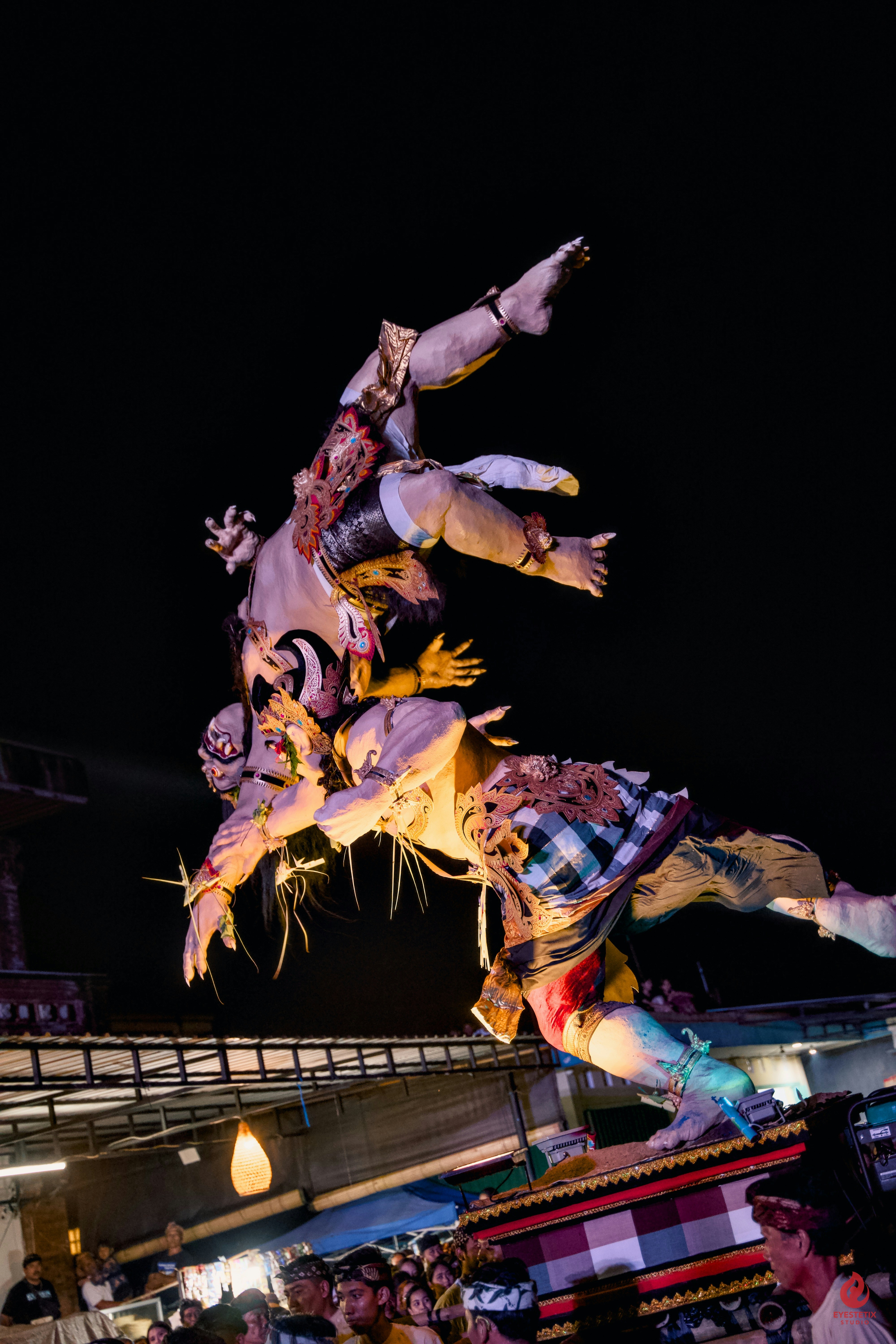 Midair Acrobat in Colorful Festival Attire