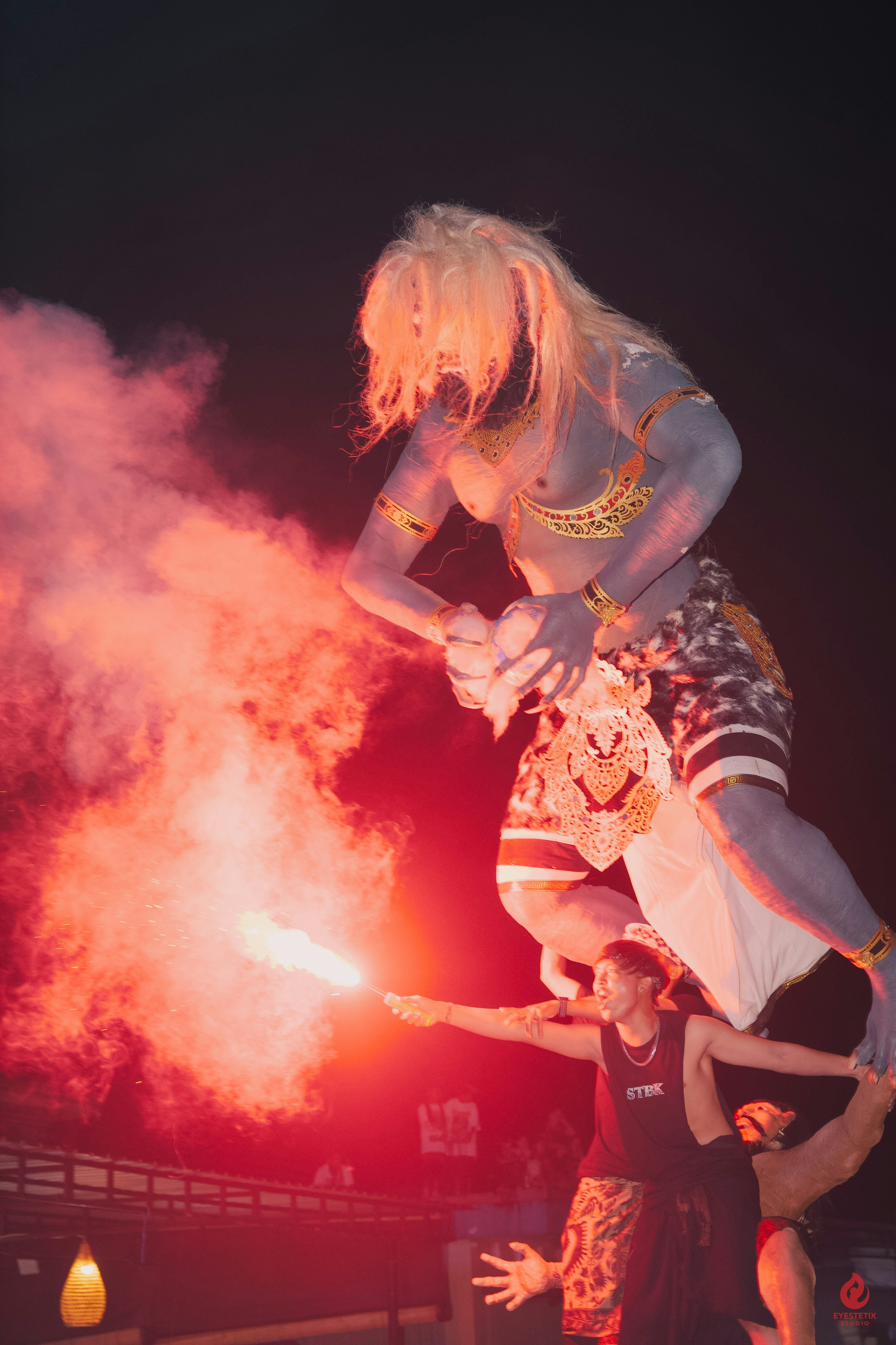 Flaming Acrobats: Fire and Dance Under Nightfall