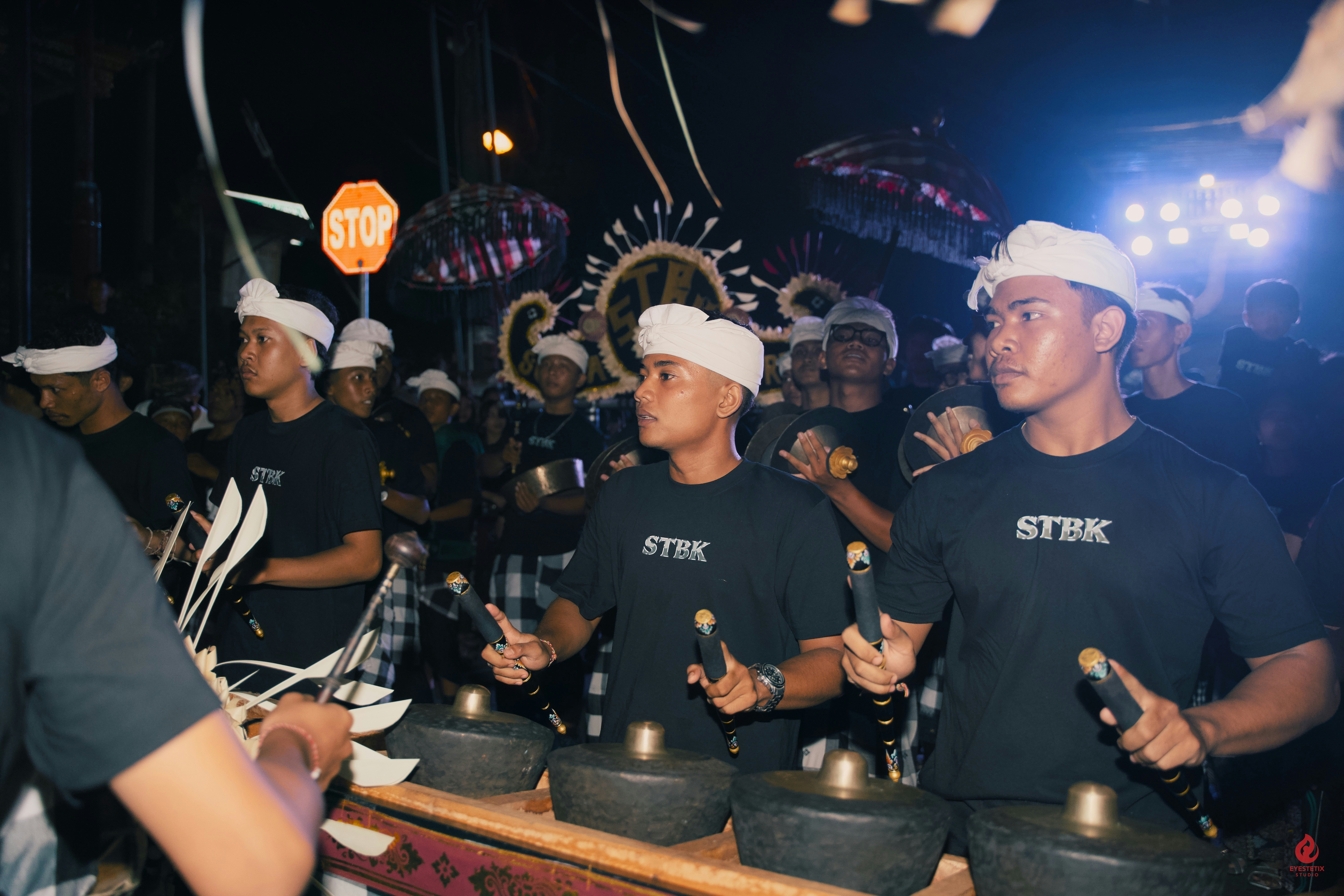 Midnight Percussion: Drummers in Uniform Under Night Lights