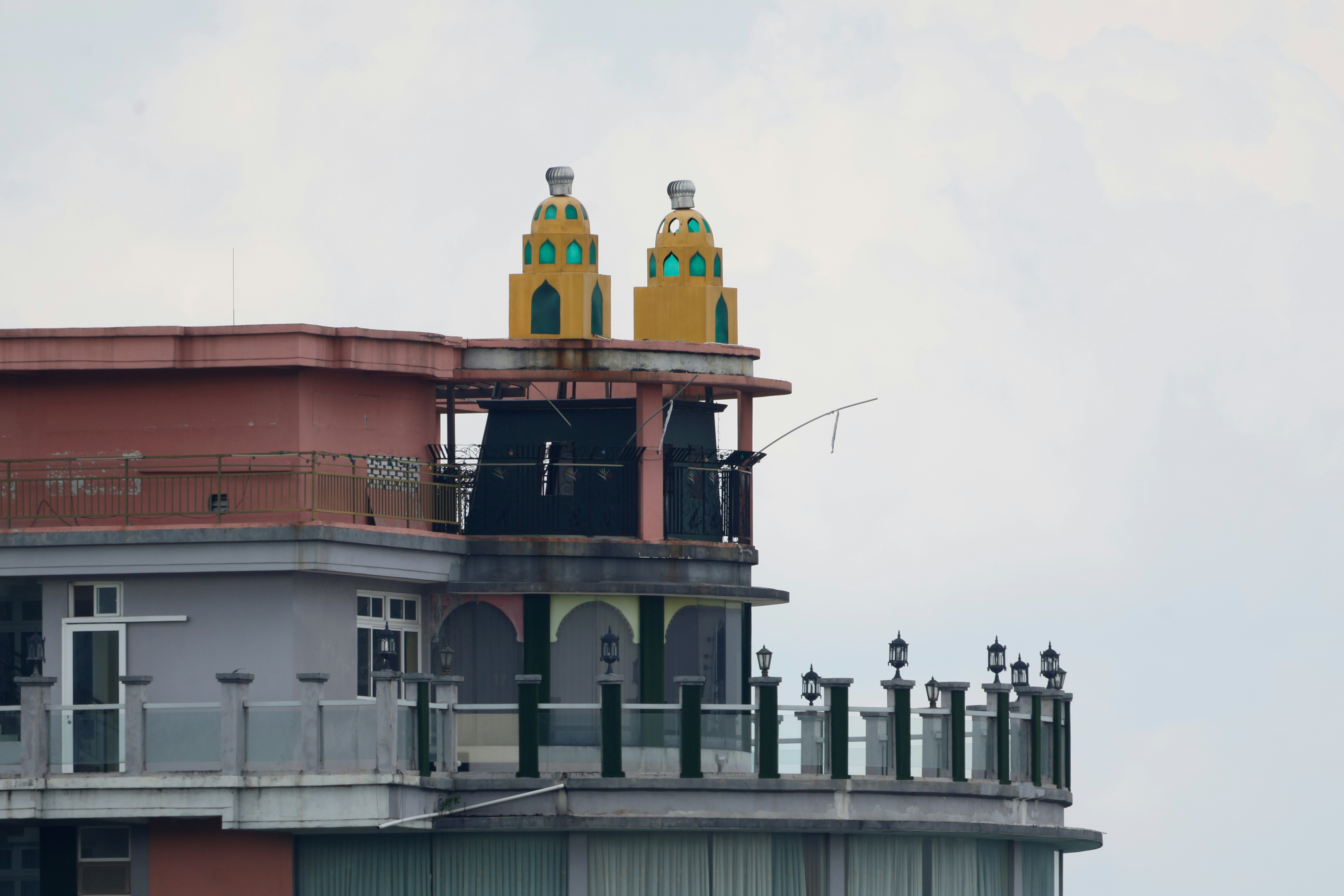 Rooftop Temples: Twin Turrets Over a City Balcony