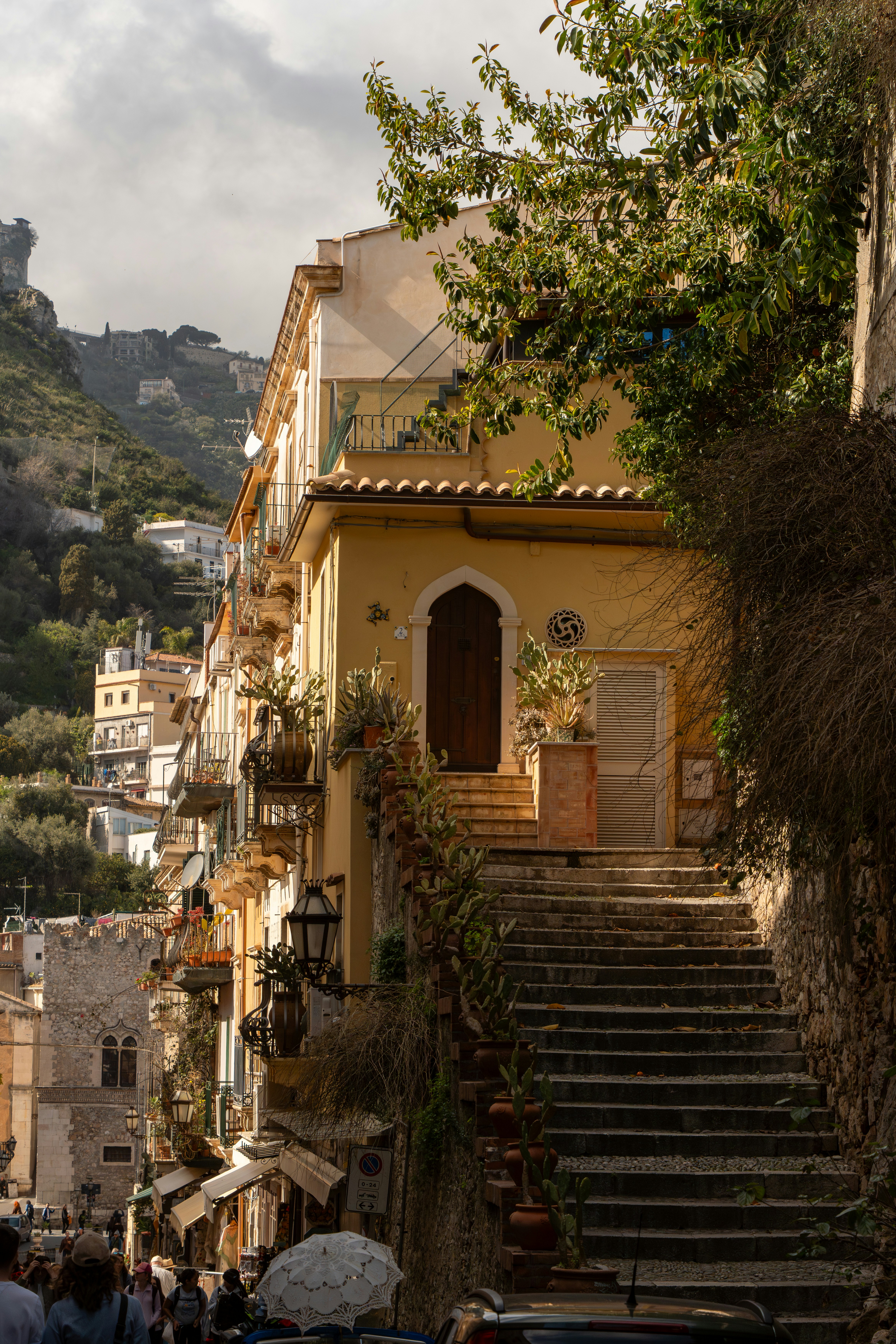 A Mediterranean Staircase to a Yellow Door