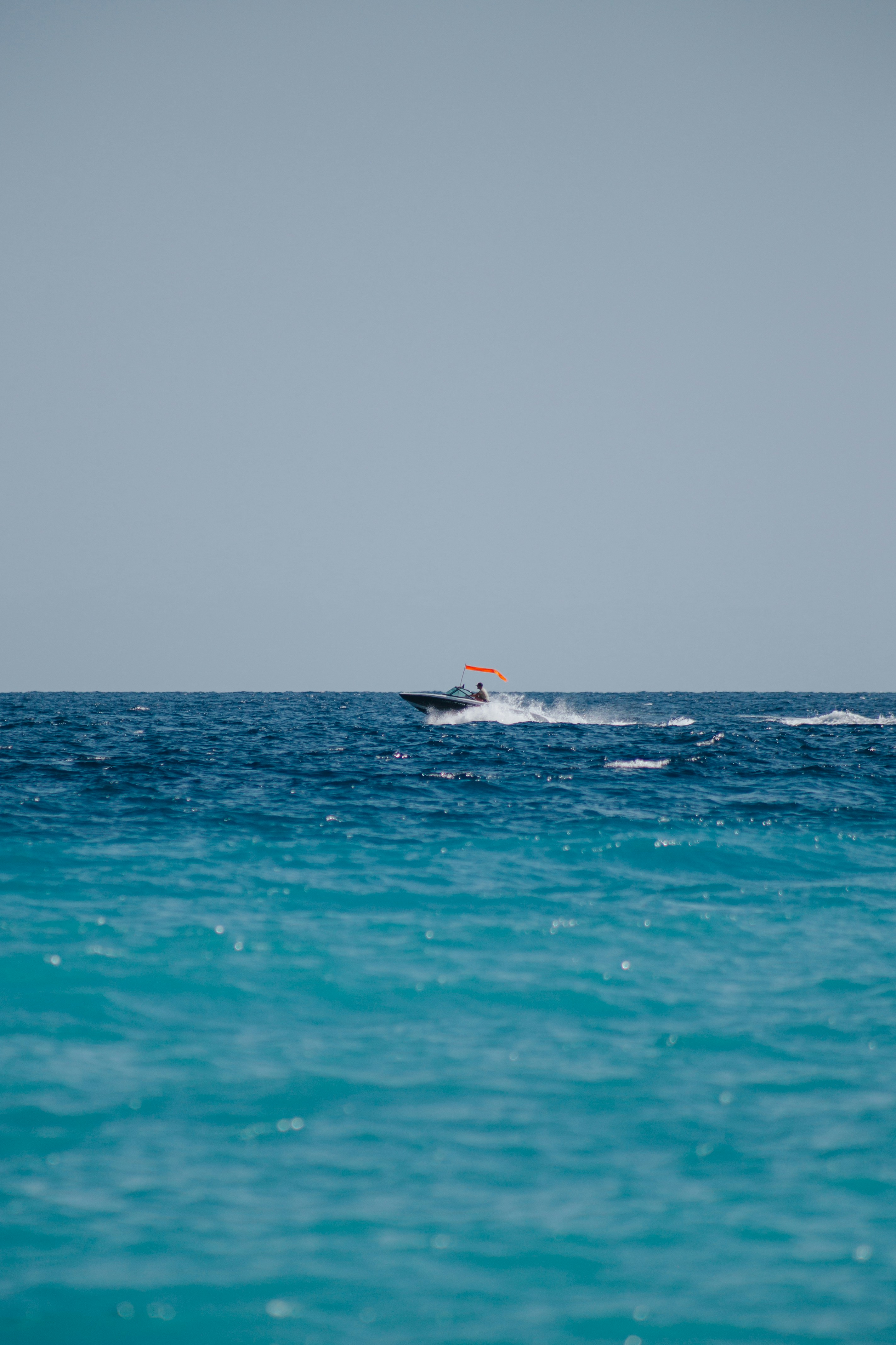 Jet Boat Skimming the Horizon