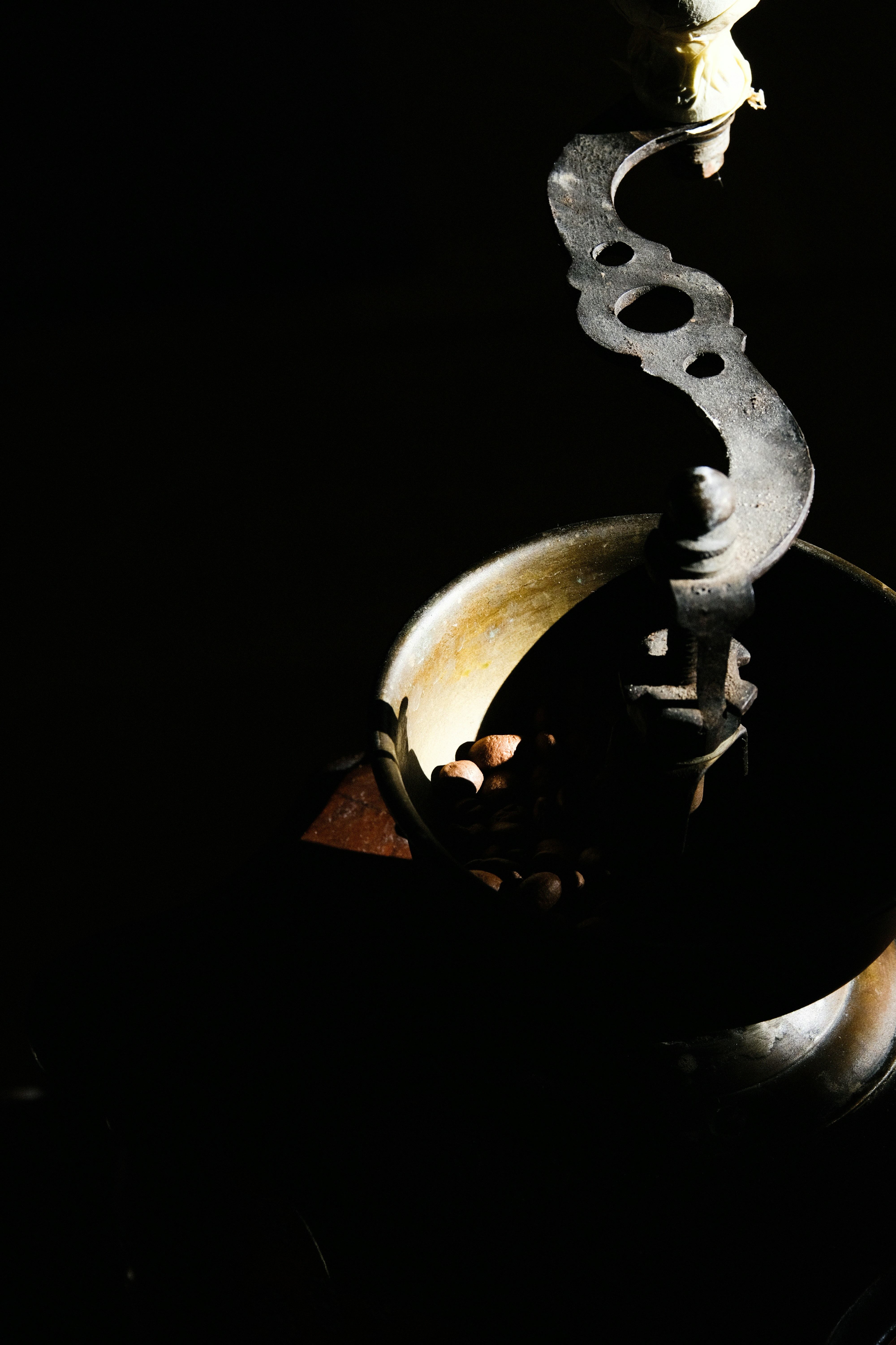 Quiet Flame: The Lotus-Top Lamp in Shadow