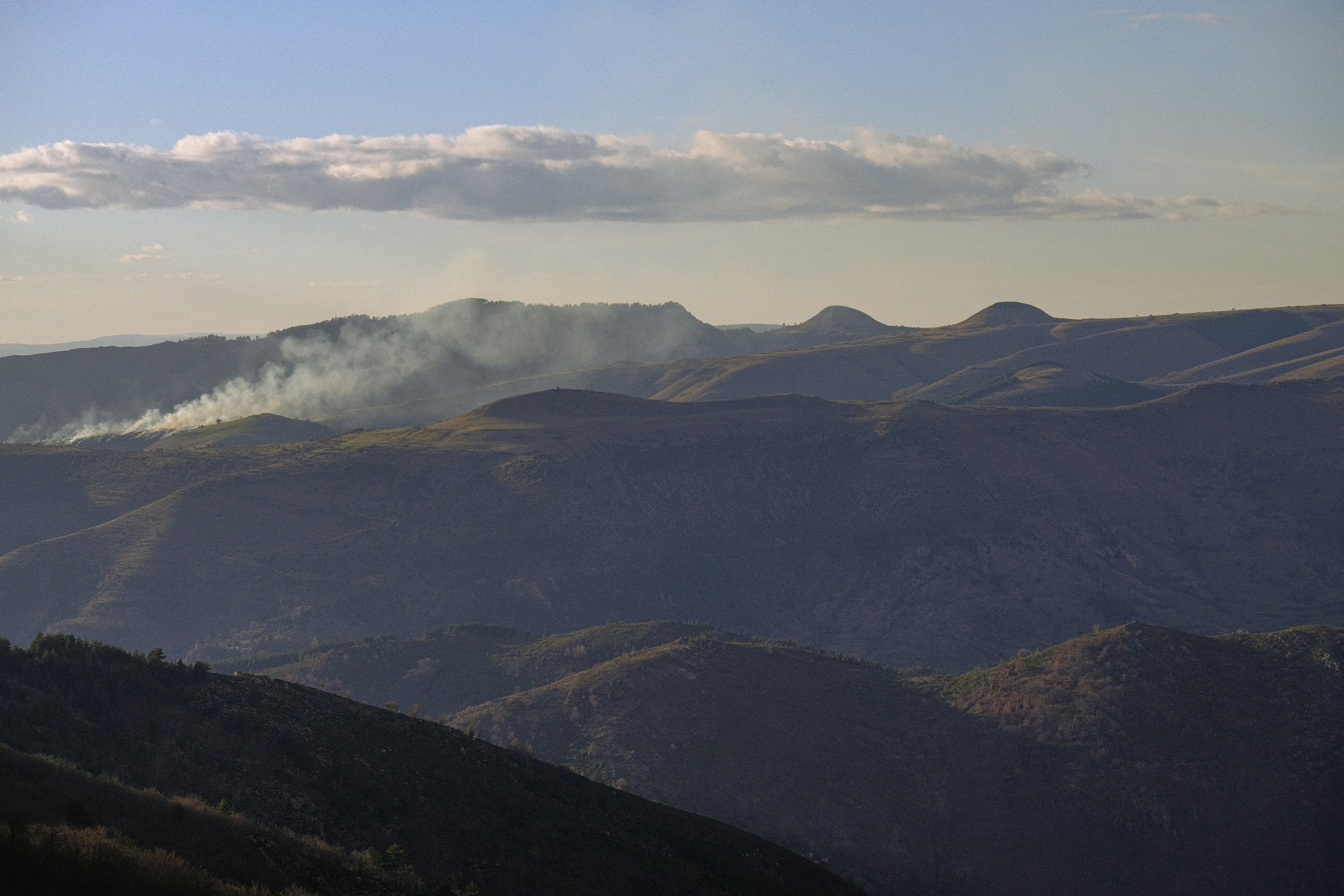 Smoke over the Ridge: Quiet Volumes of Distant Hills