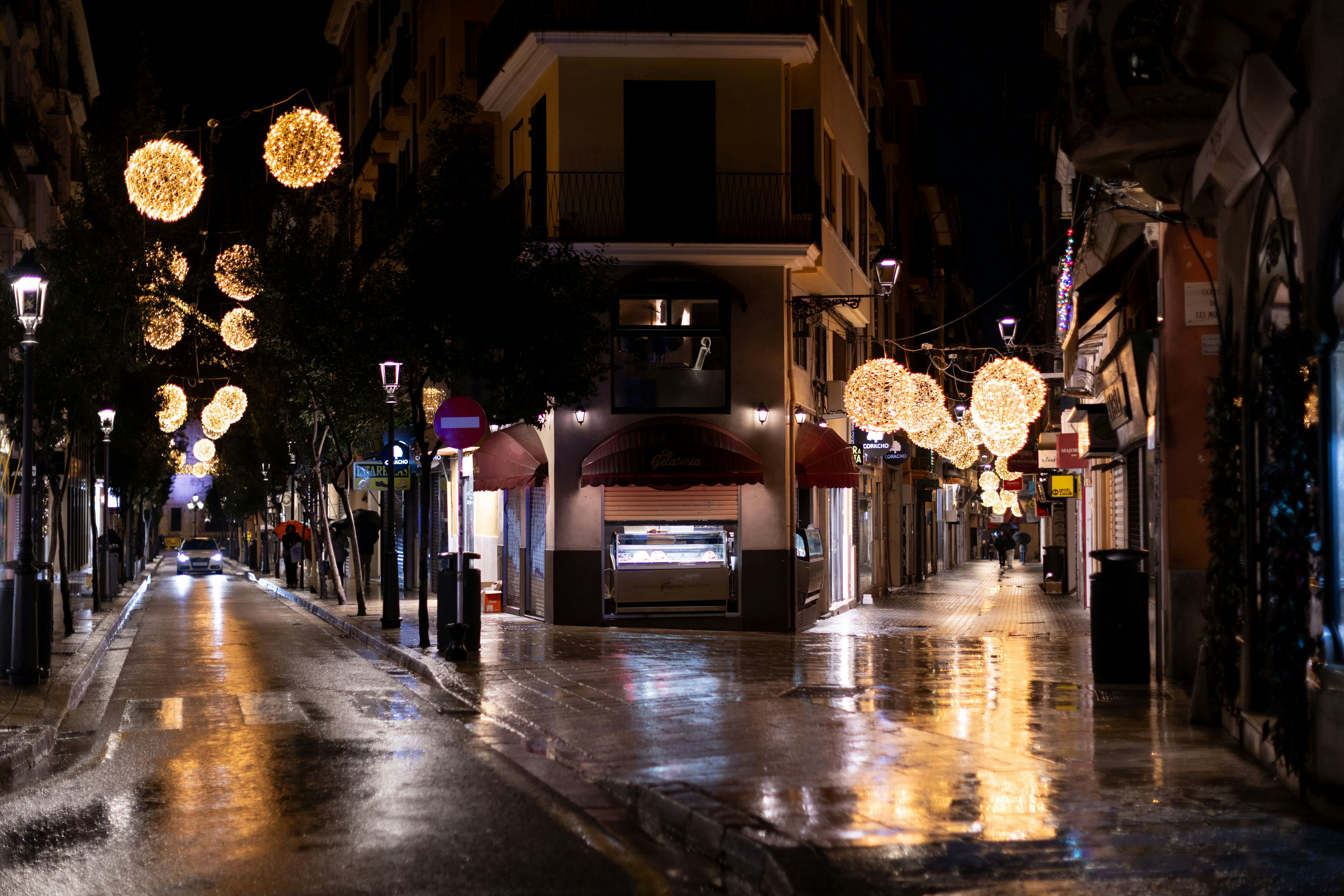 Glowing Calle: Night Street with Orbital Lights