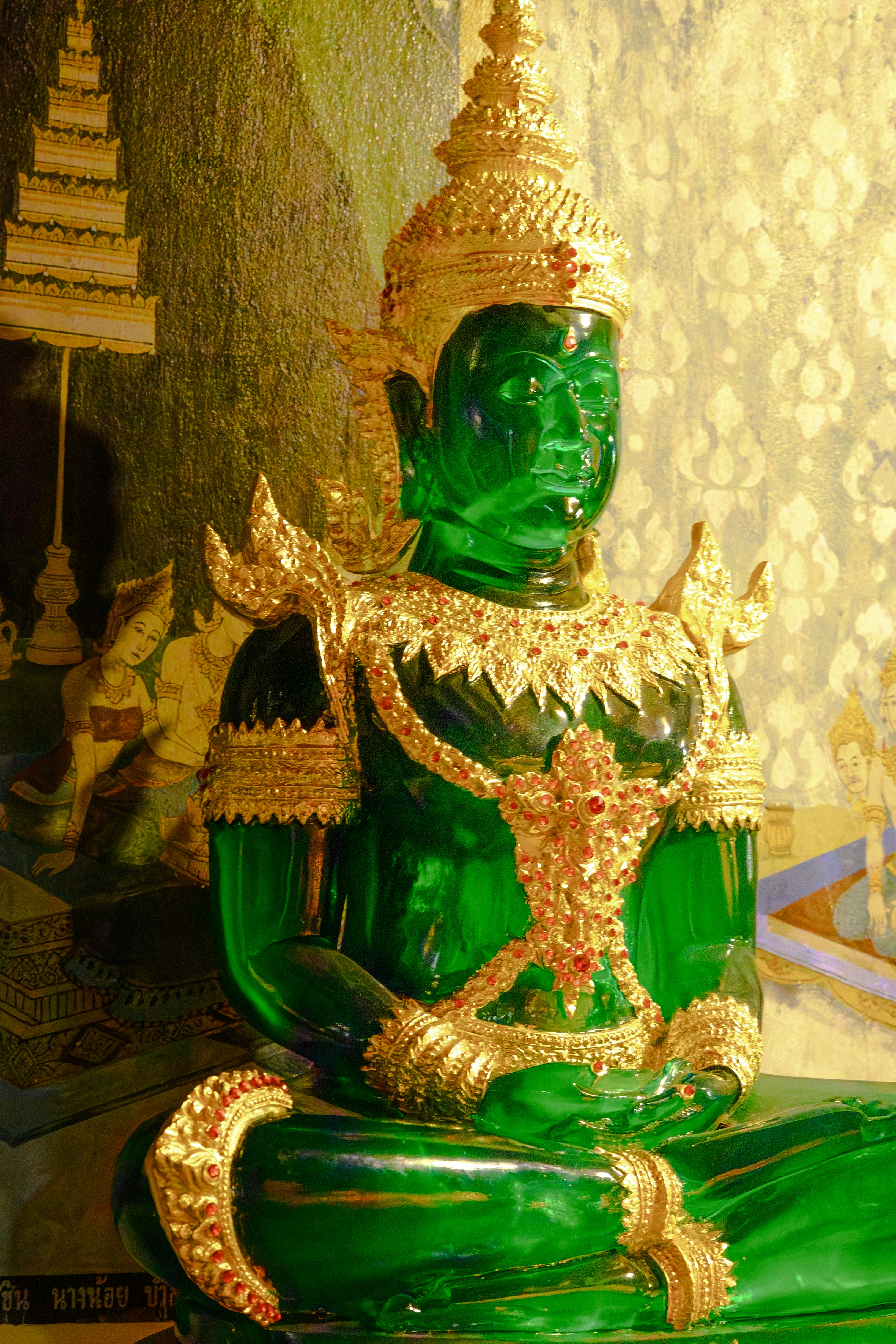 Emerald Guardian in Gold: A Regal Green Figure Within a Shrine Scene