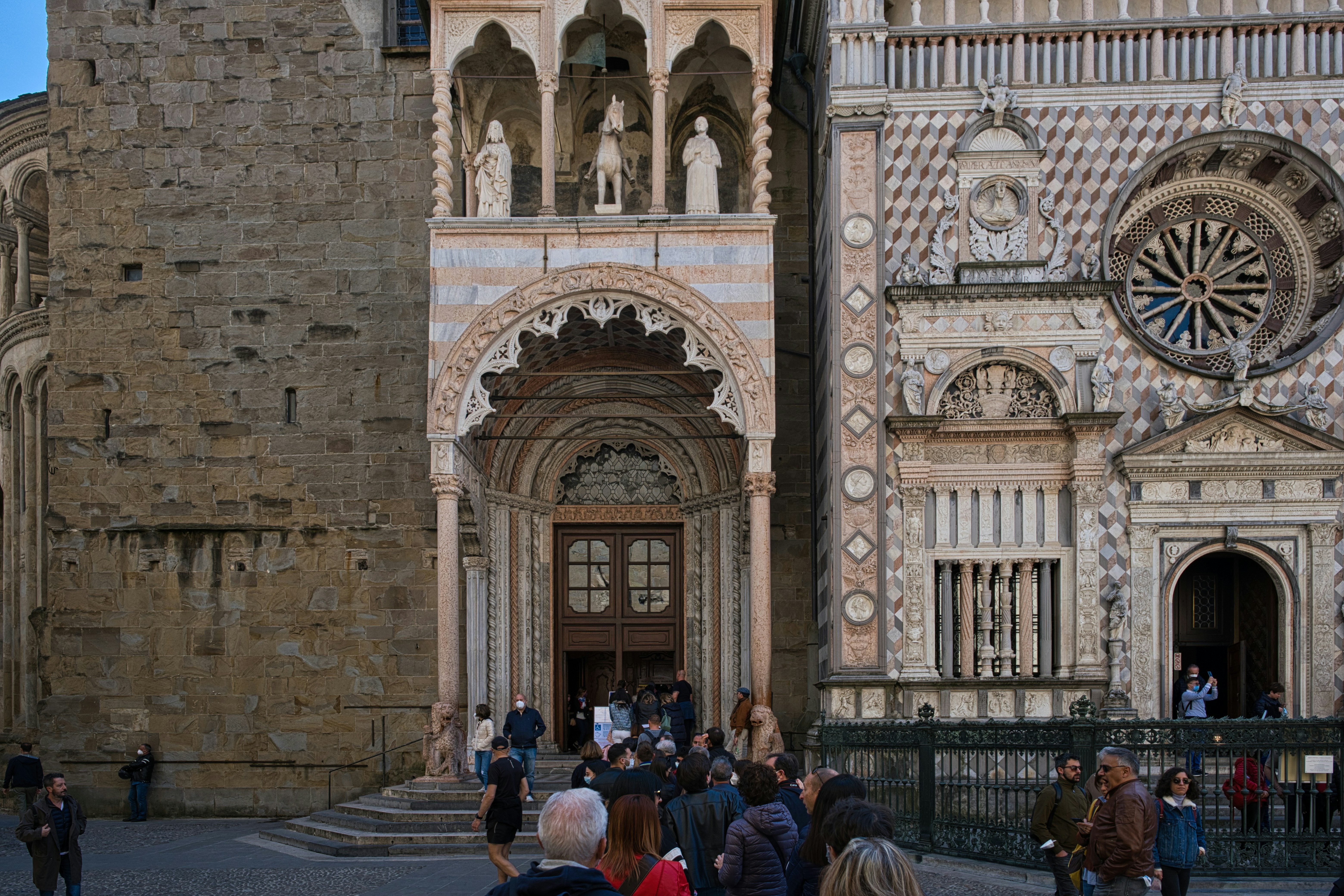 Crowd Beneath the Ornate Cathedral Portal