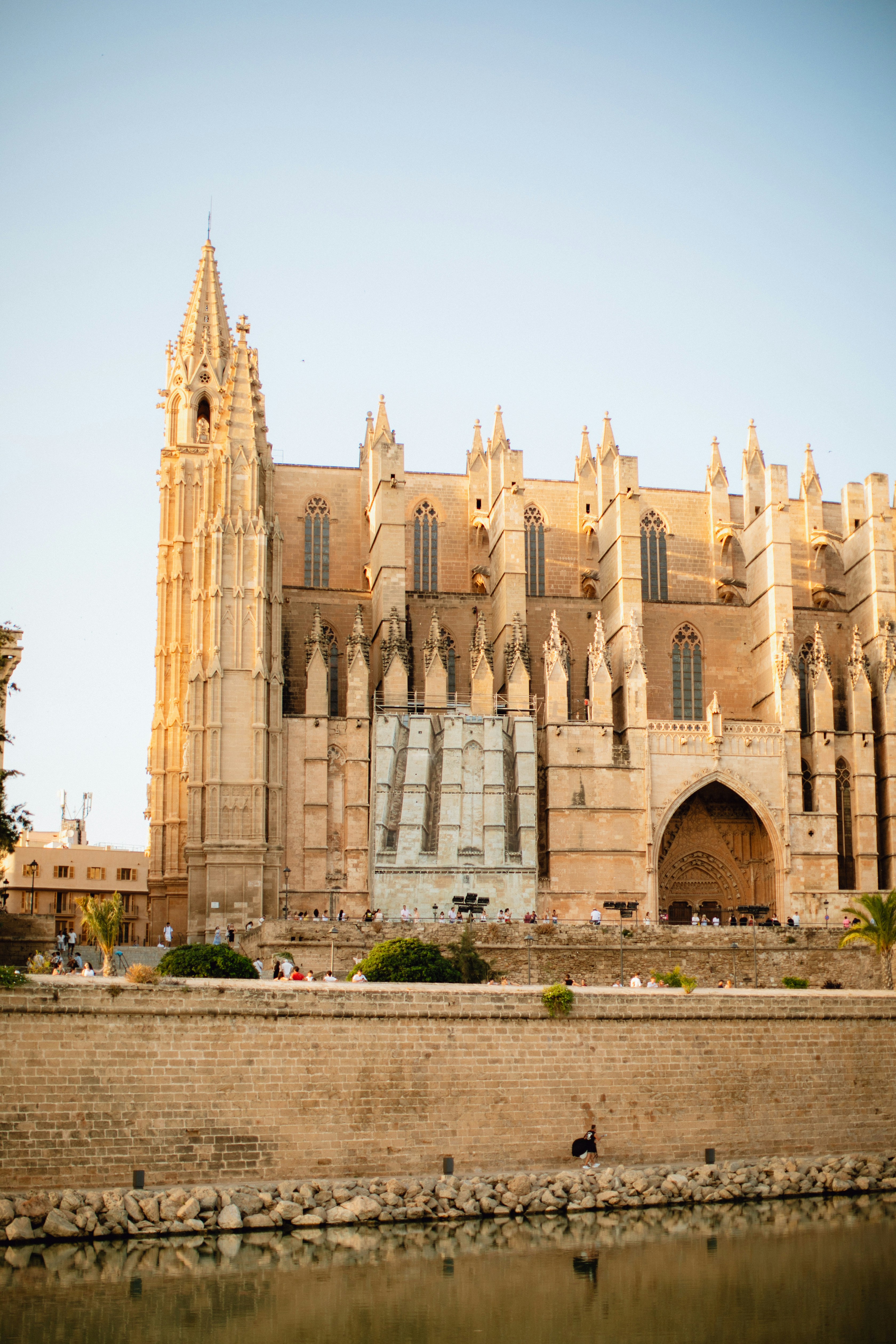 Gothic Cathedral by the River: Sunrise Light on Stone Spires