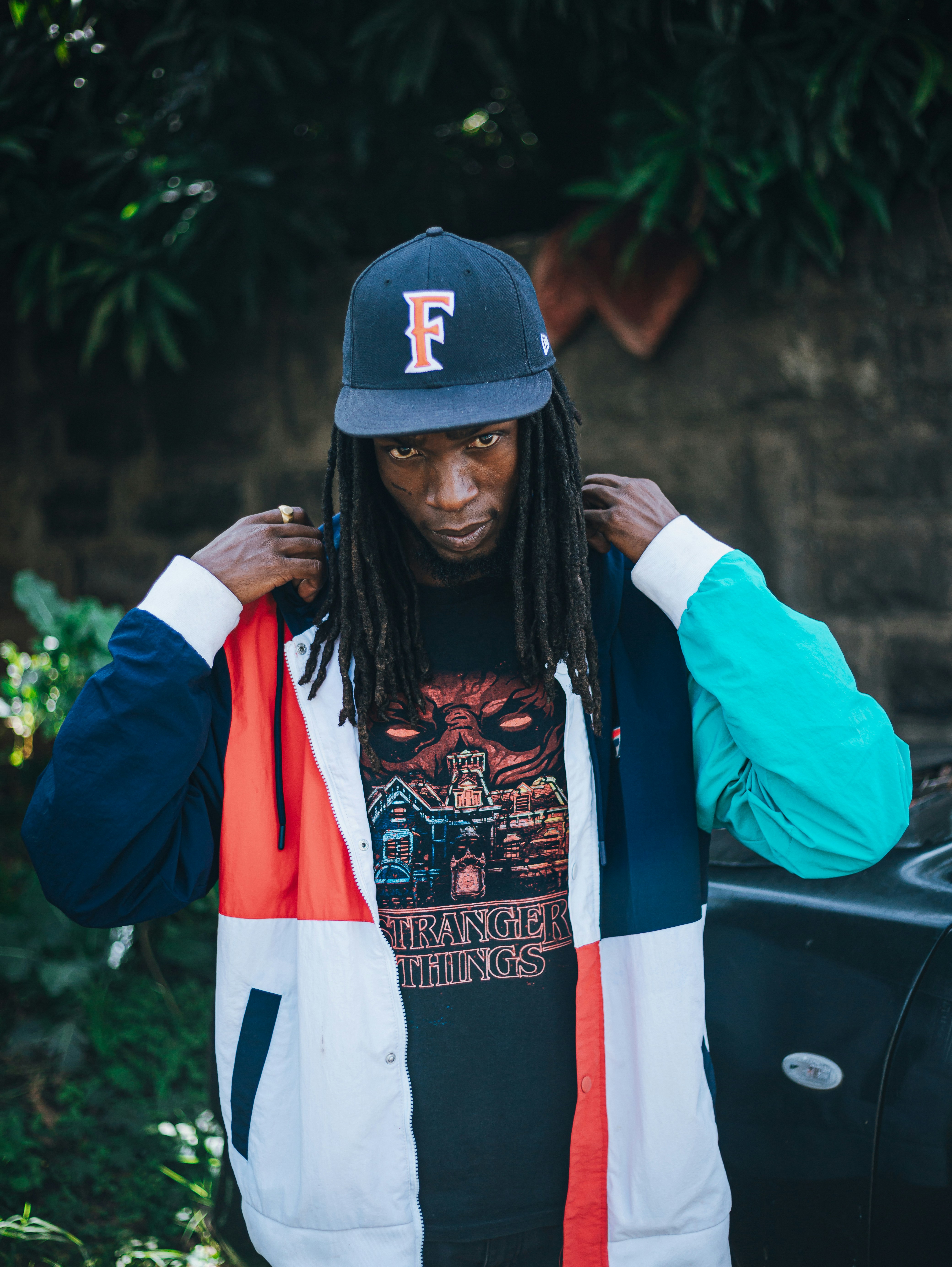 Portrait of a Streetwear Enthusiast in a Colorblocked Jacket