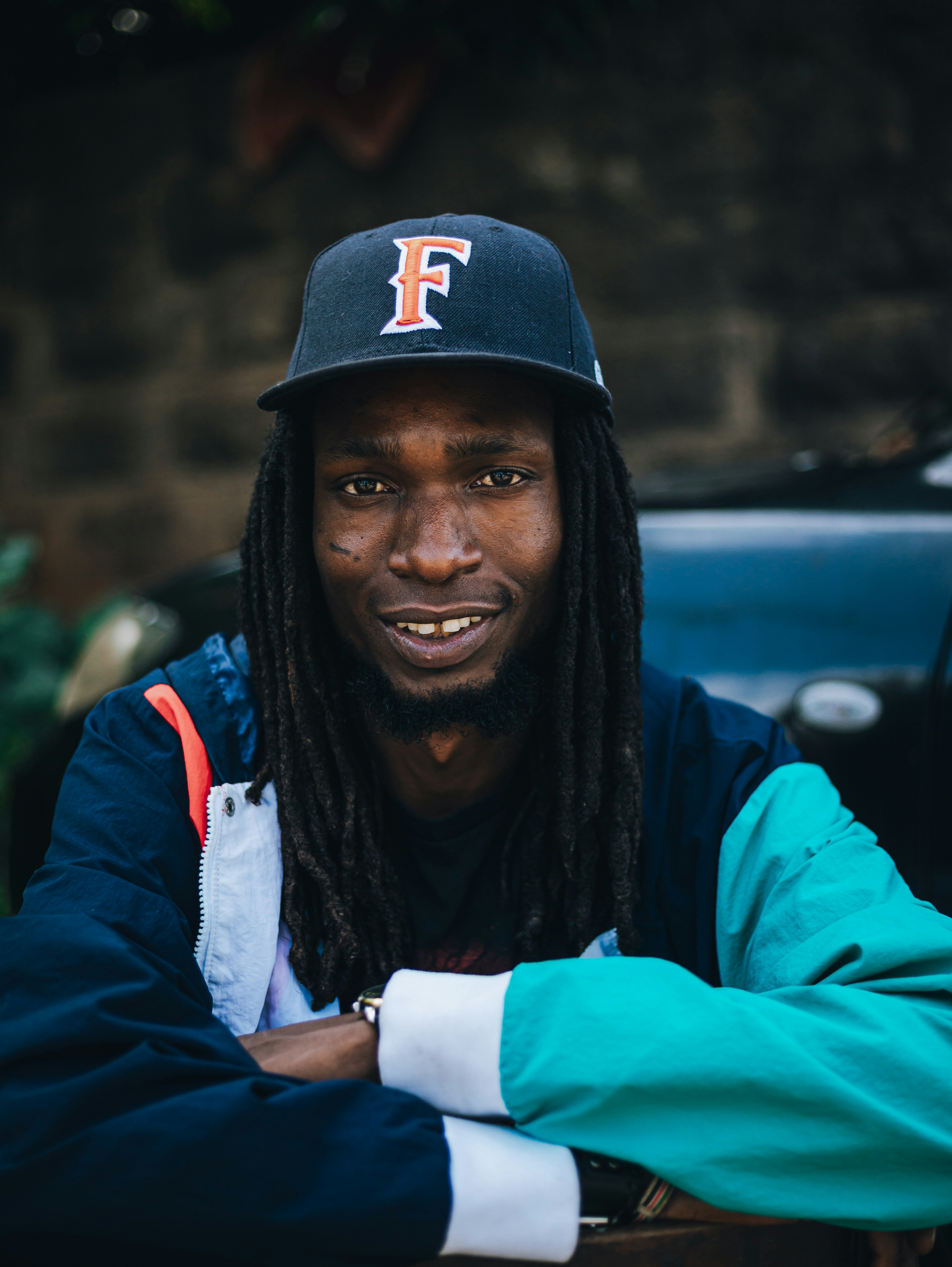 Grounded Confidence: Portrait of a Smiling Street Stylist