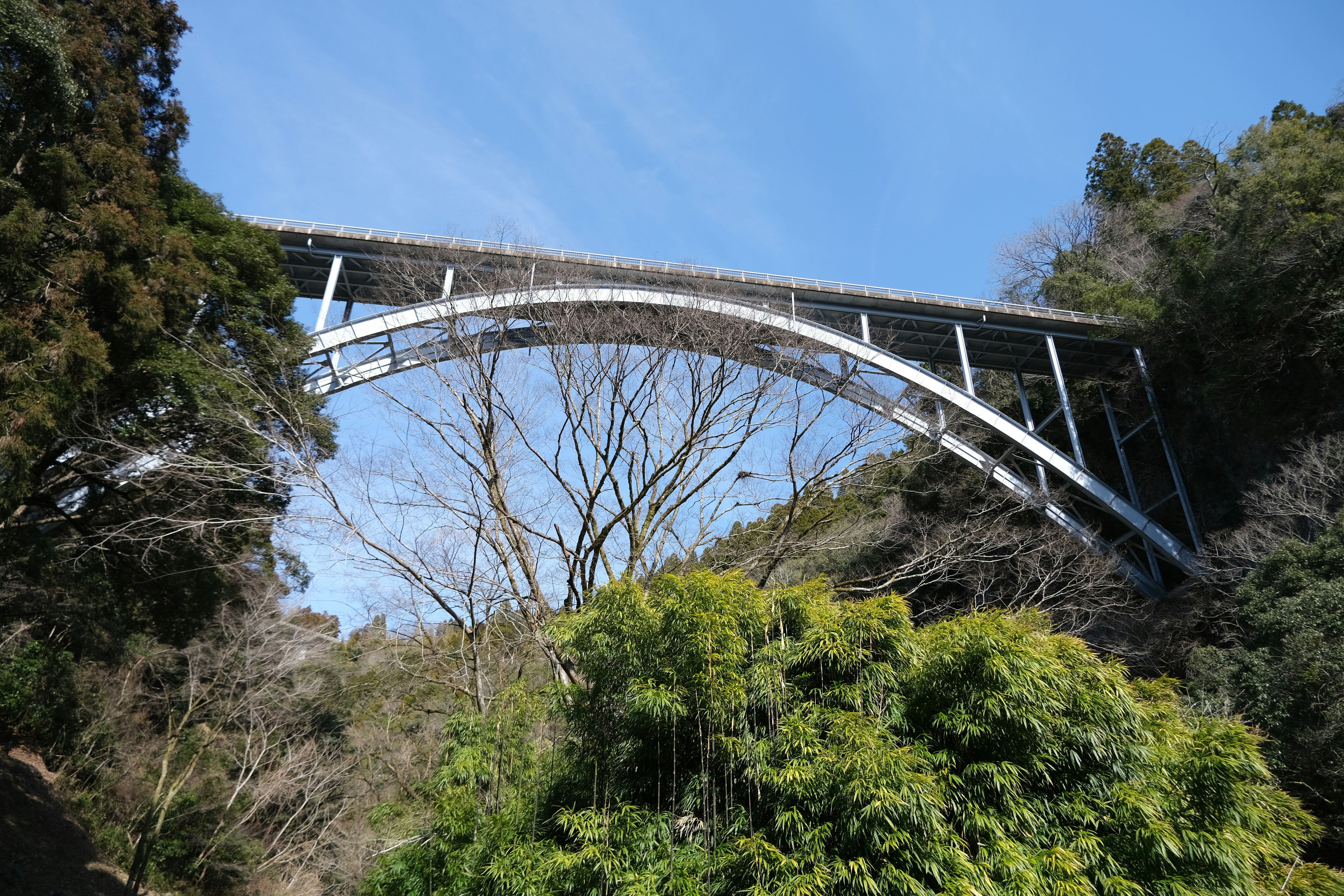 Arc of Steel Above Green Valleys