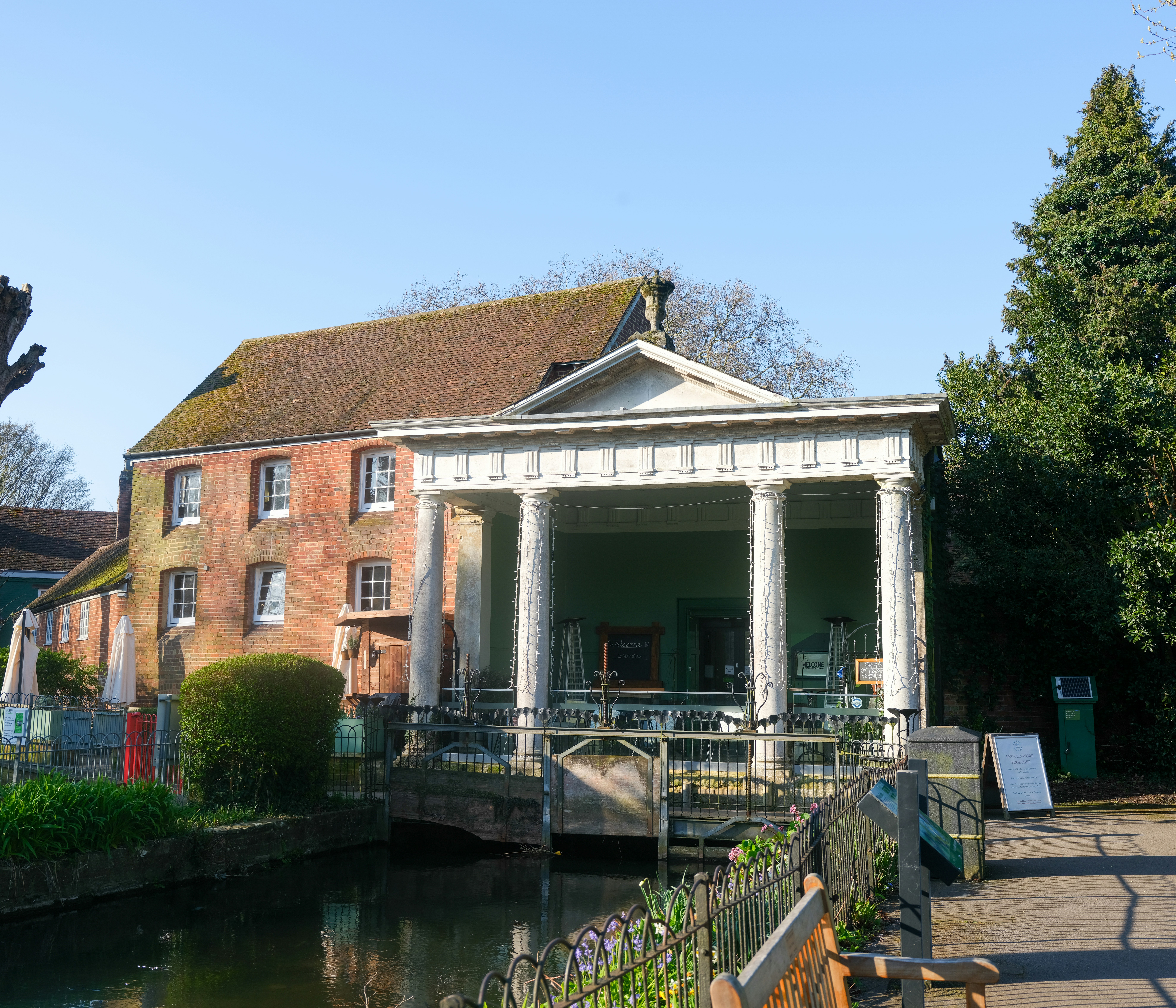 Colonnaded Channel House by the Canal