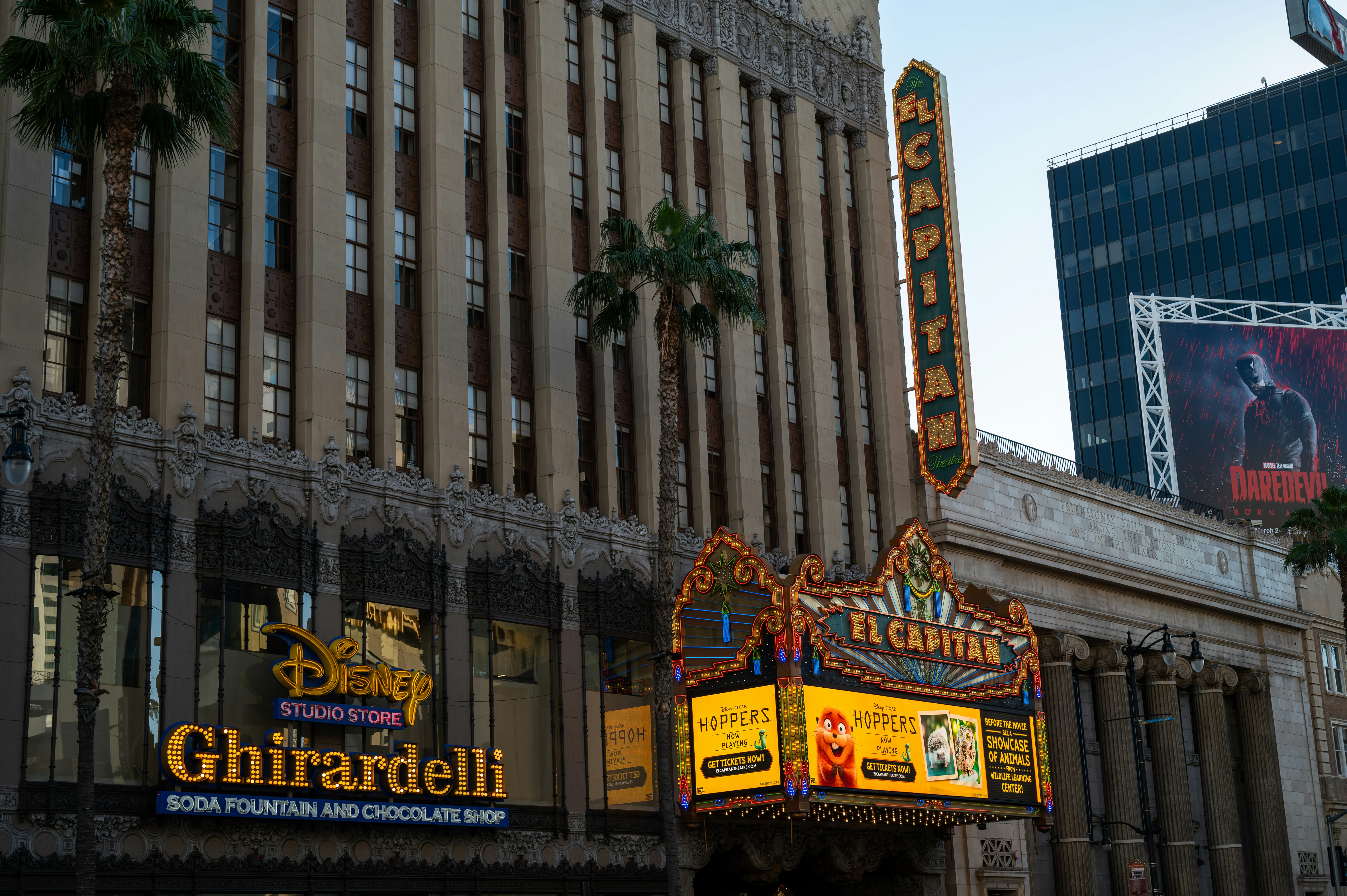 Neon Theatre Marquee Amid Classic Hollywood Facades