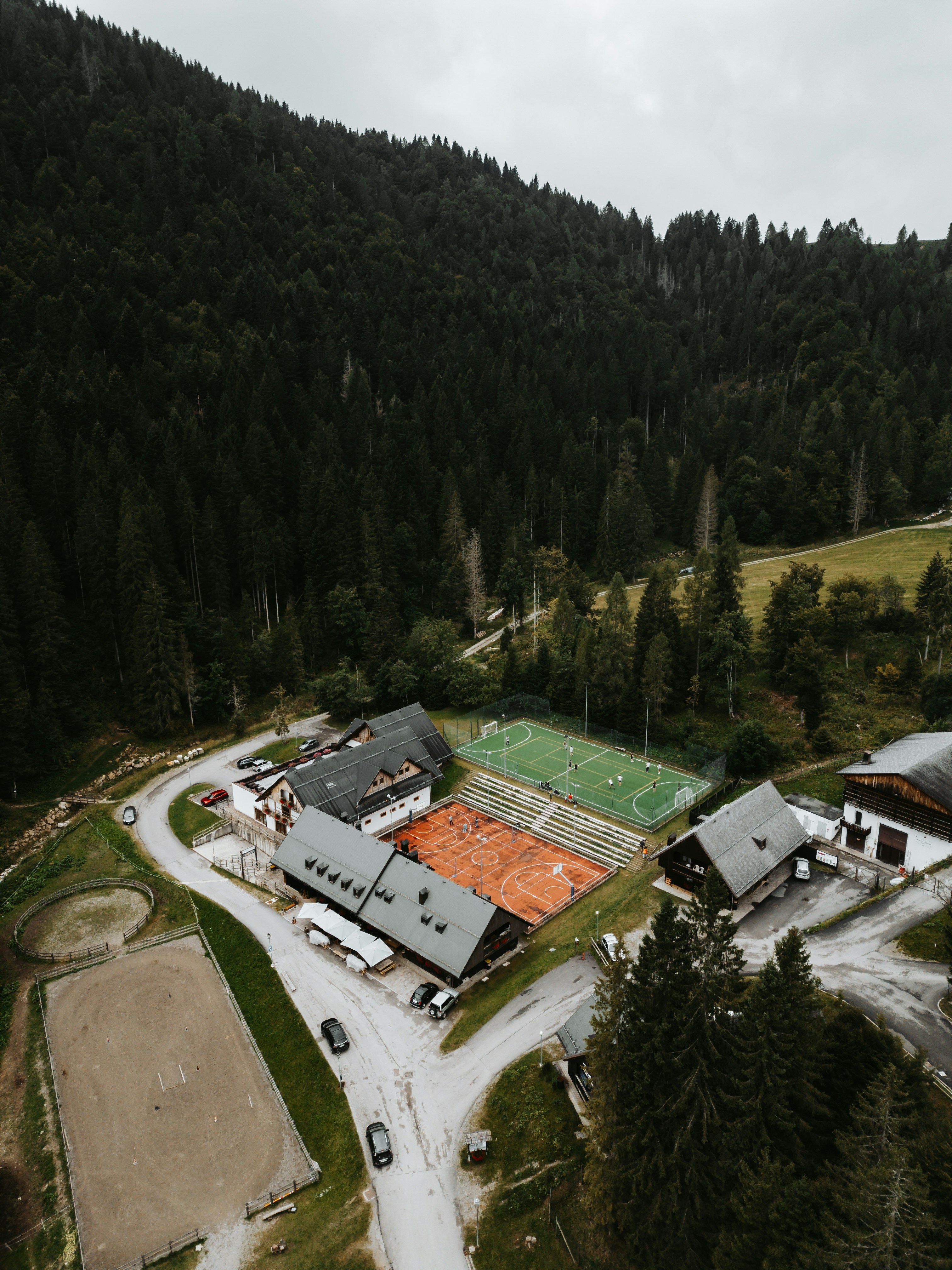 Fields of Play Among Pine Peaks: Aerial Gauge of a Mountain Dormitory Complex