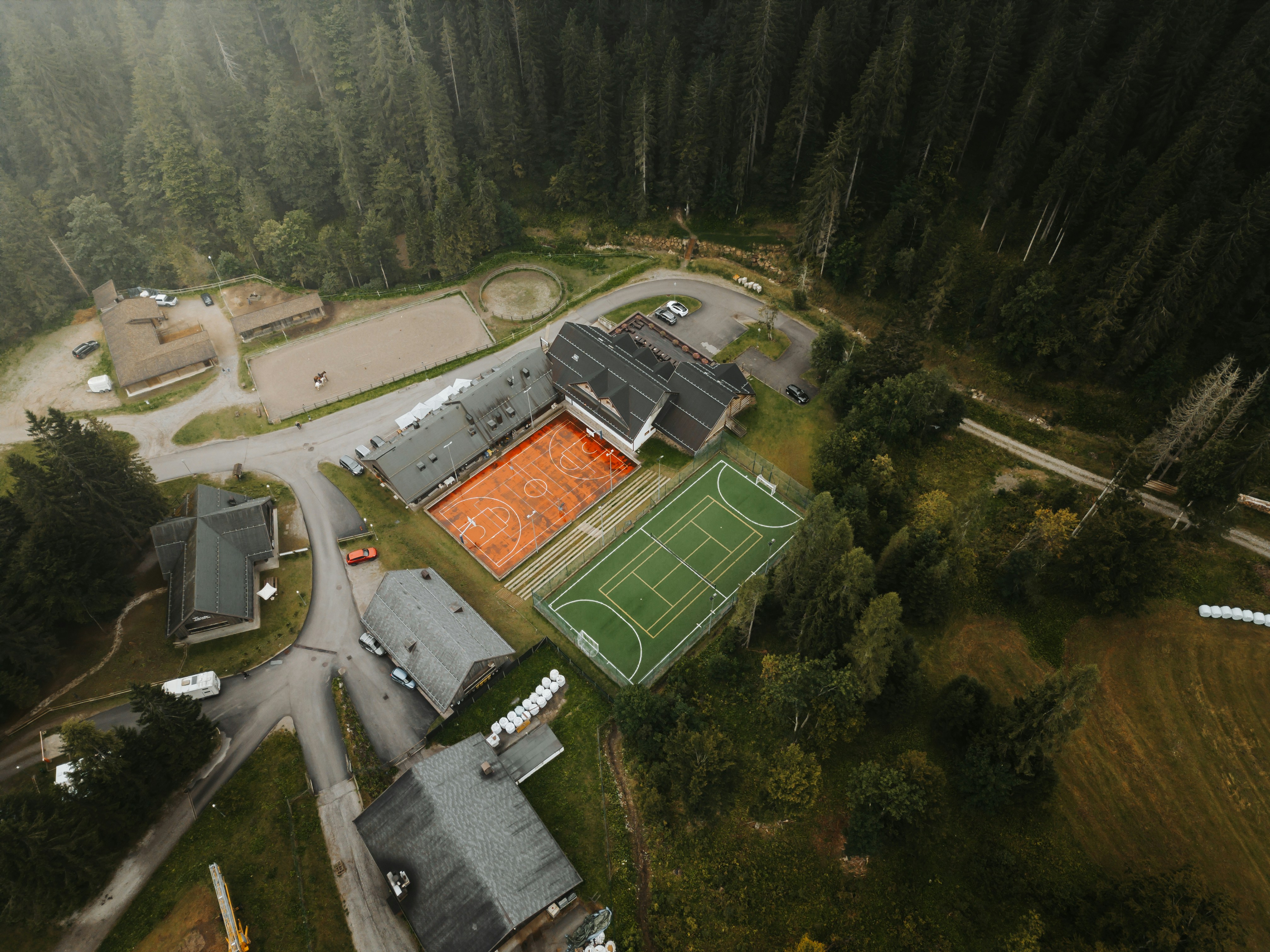 Aerial Campus: Courts and Buildings Nestled in the Pines