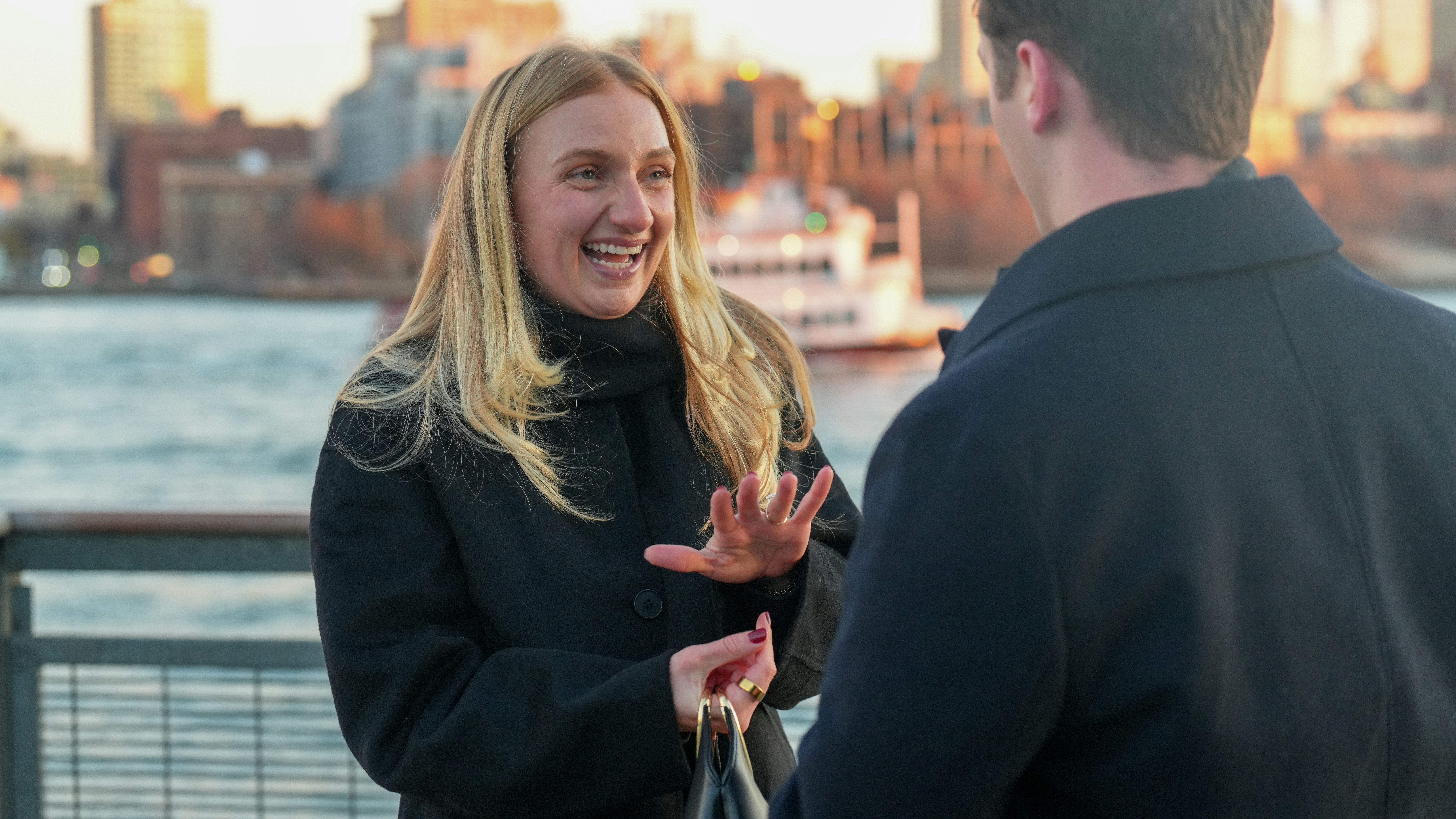 Conversation by the Waterfront: Laughter Amid the City Glow