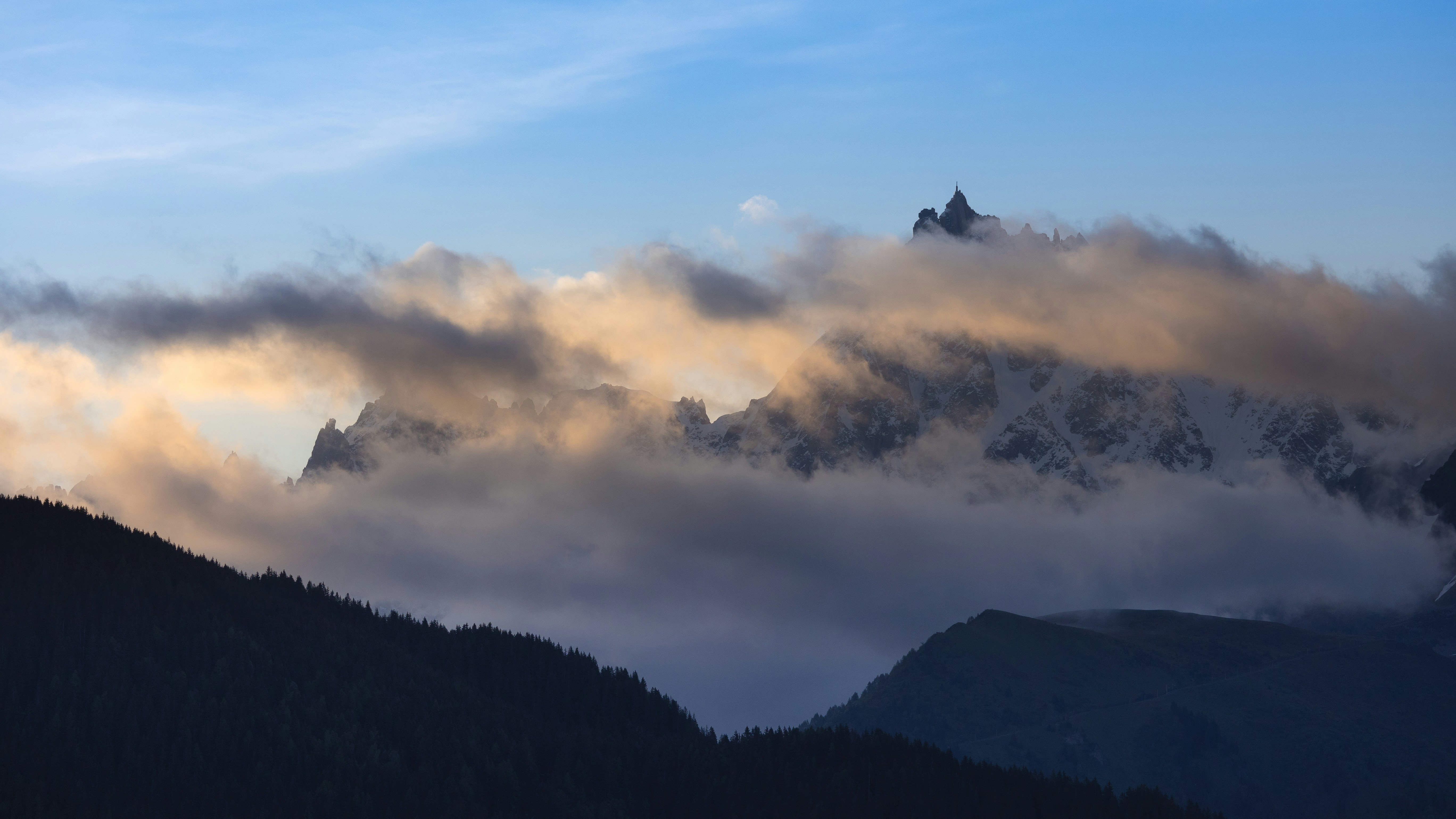 Peak Crown in the Cloud Veil