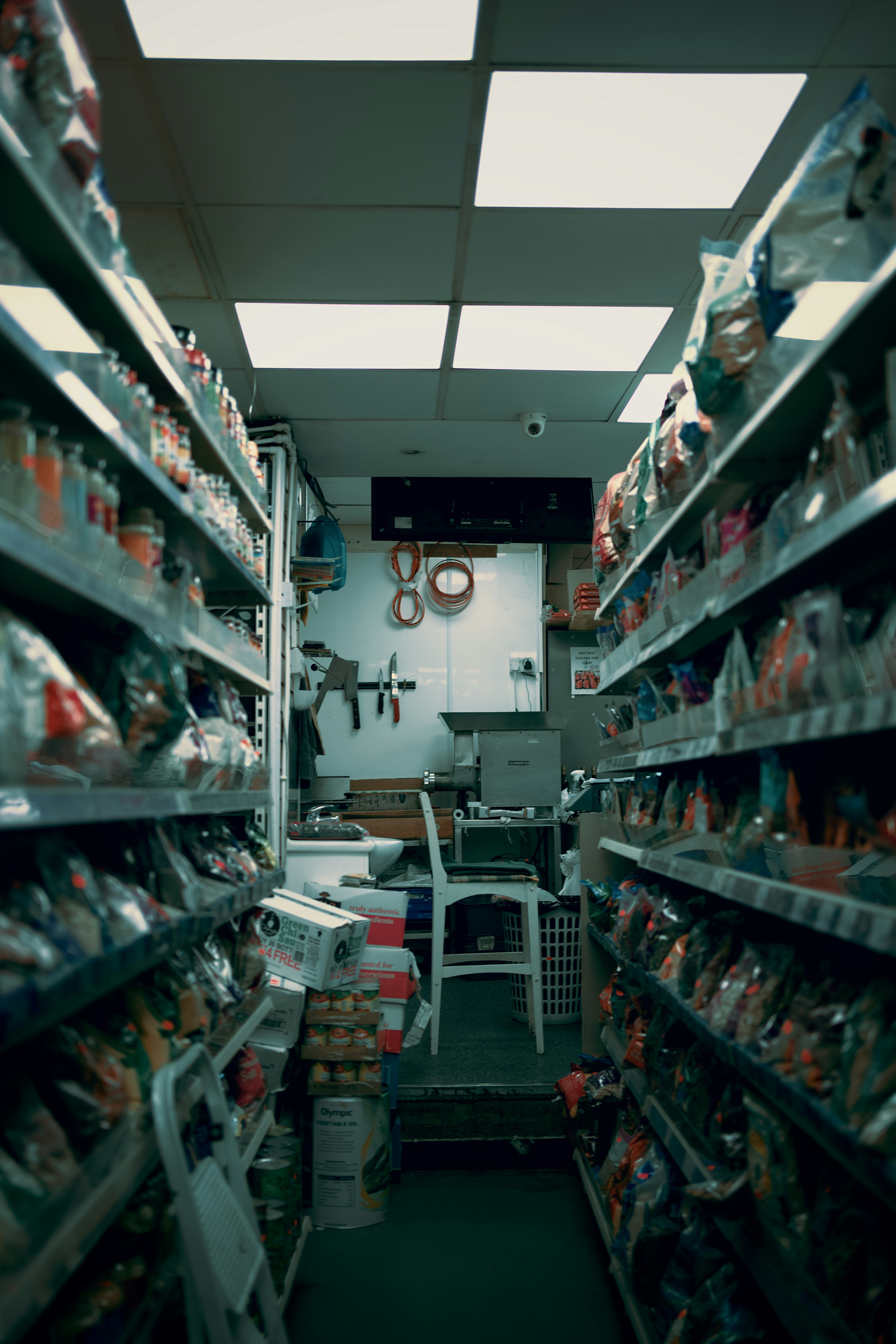 Aisle of Goods: Quiet Convergence at the Back Counter