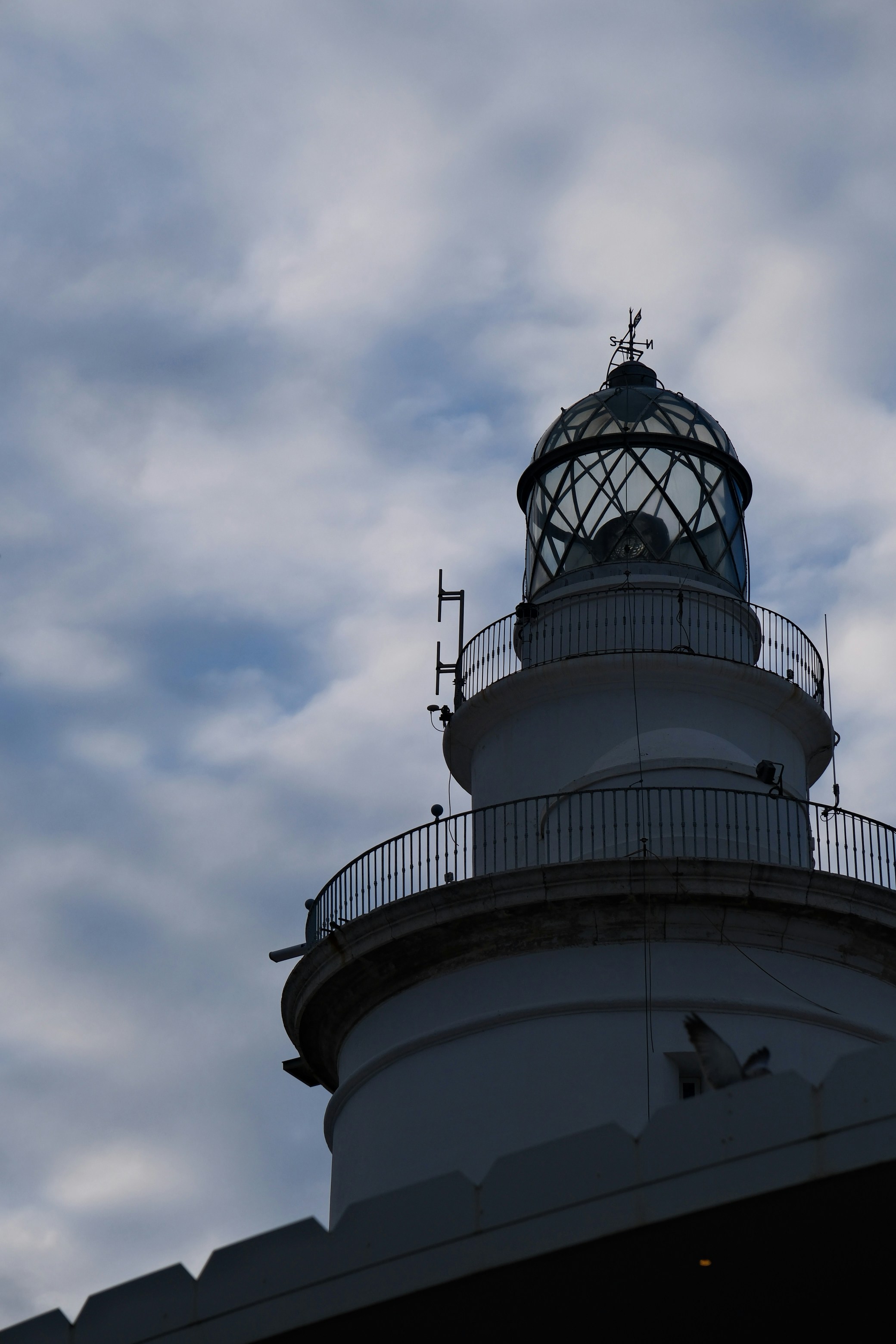 Beacon in the Sky: A Lighthouse against the Clouded Dawn
