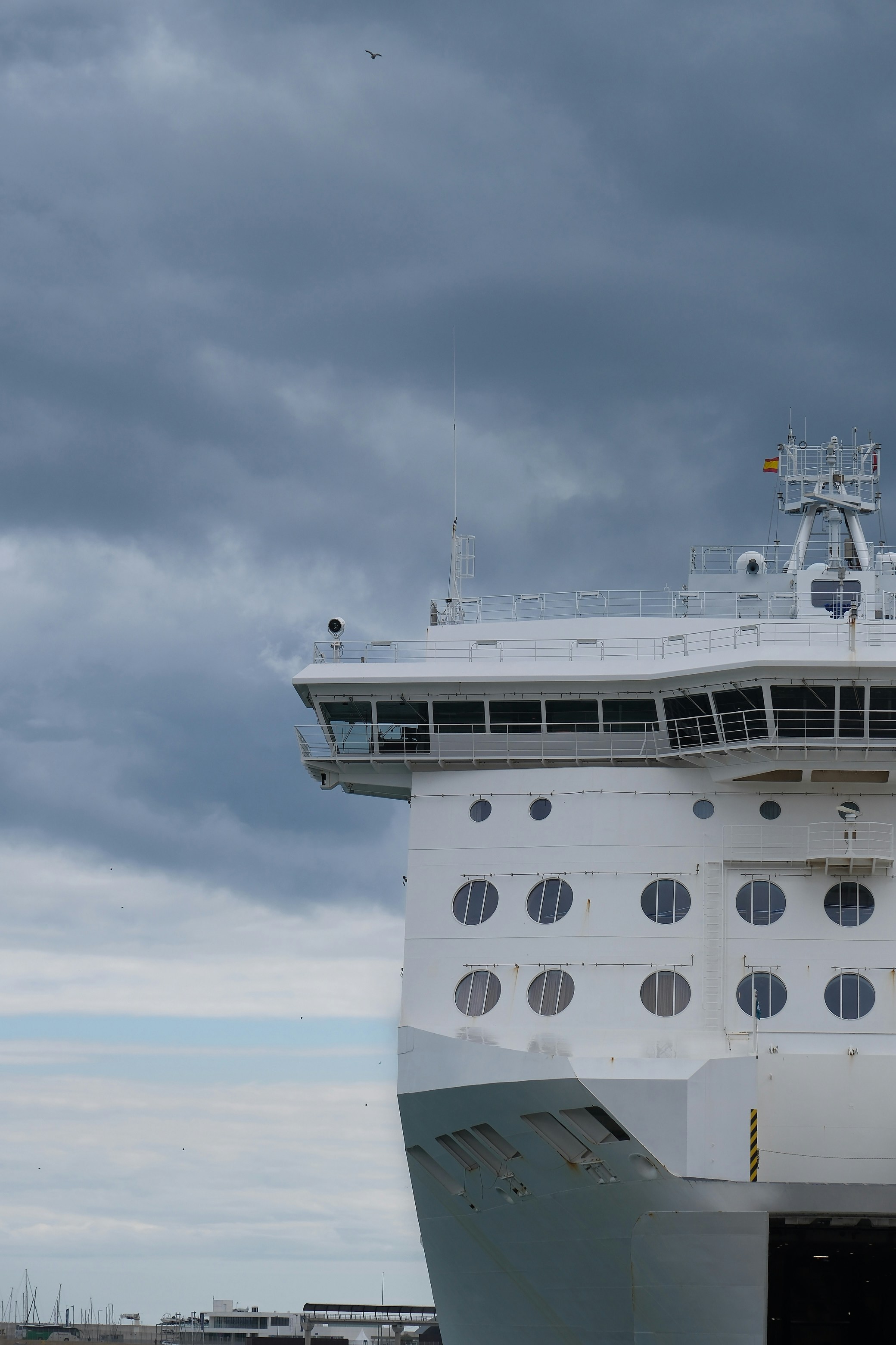 Majestic Oceanliner at the Edge of Storm Clouds